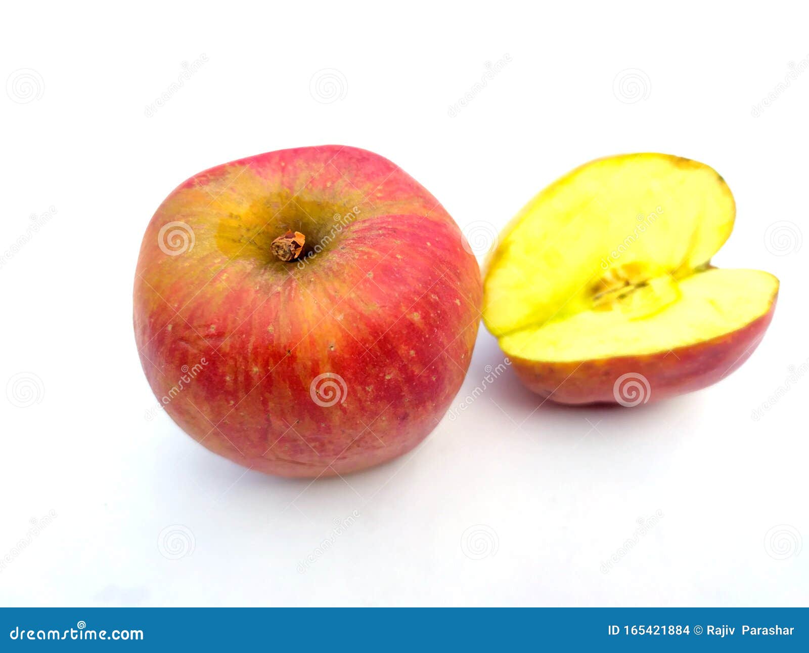 A Fresh Healthy Red Apple with a Bite of Apple on White Background ...