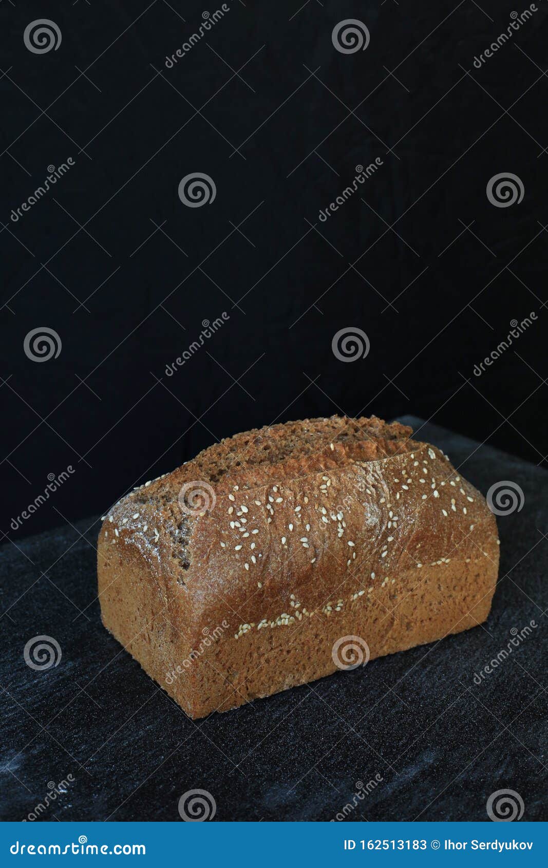 Fresh Homemade Rectangular Bread on a Dark Background. Mother Dough ...