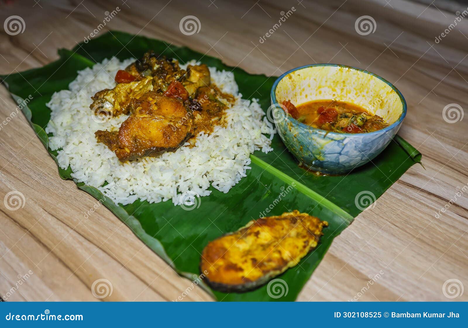 Fresh and Hot Fish and Rice Cooked Meal Served at Banana Leaf for ...