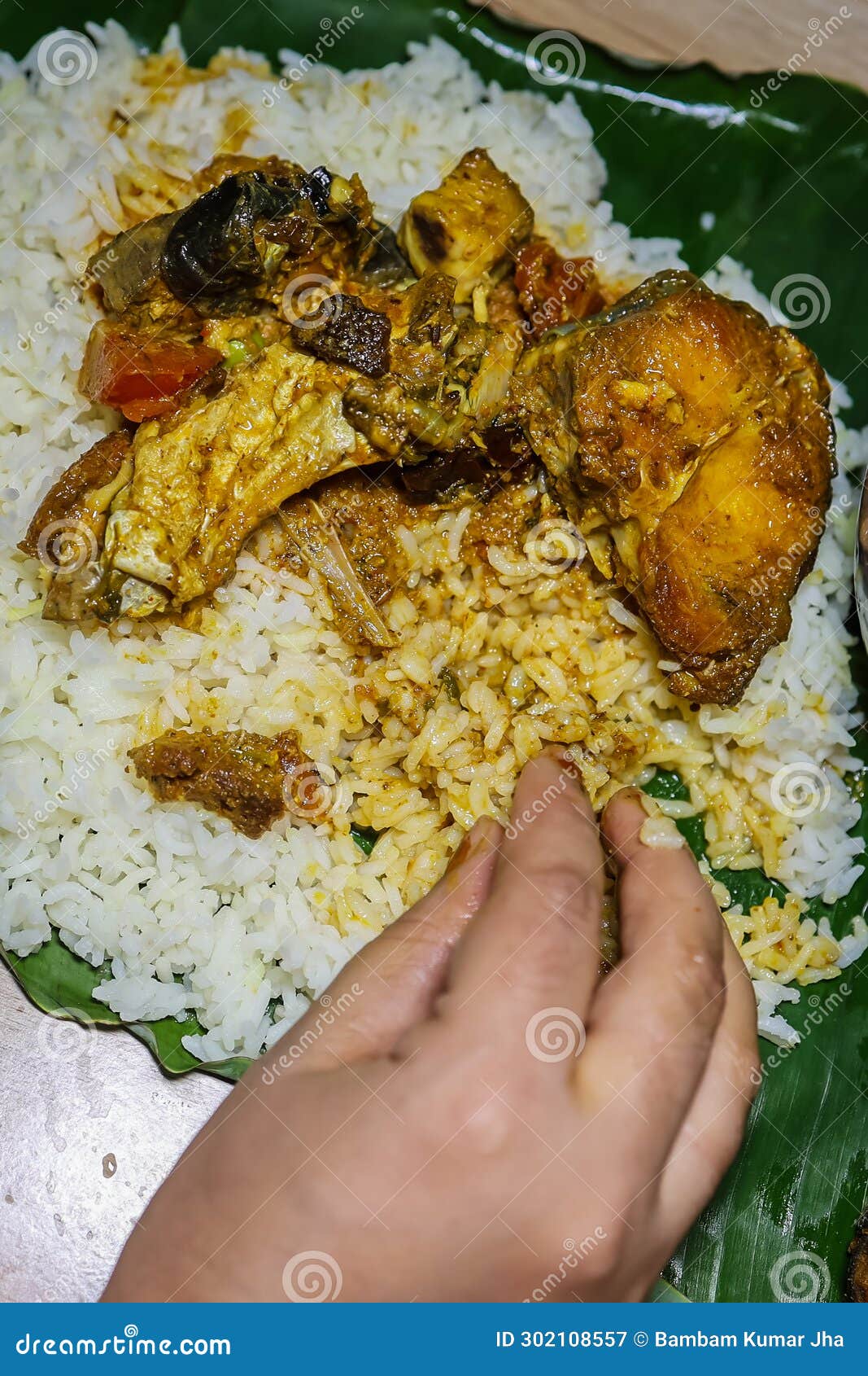 Fresh and Hot Fish and Rice Cooked Meal Served at Banana Leaf for ...