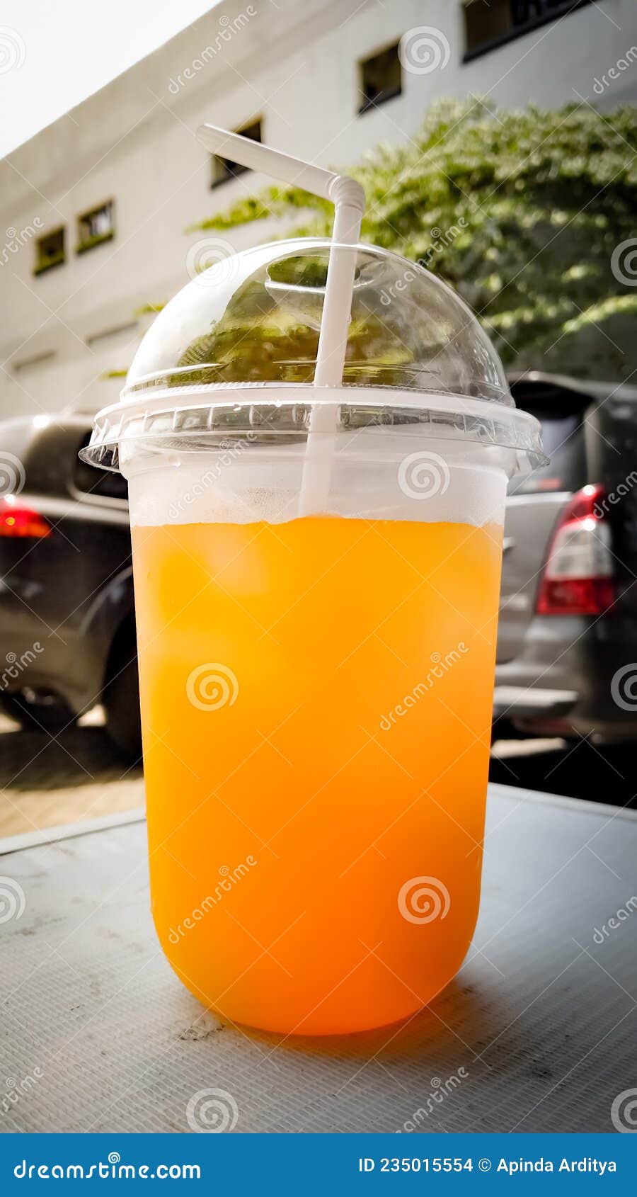 Fresh Ice Cold Orange Juice in Plastic Cup Stock Photo - Image of ...
