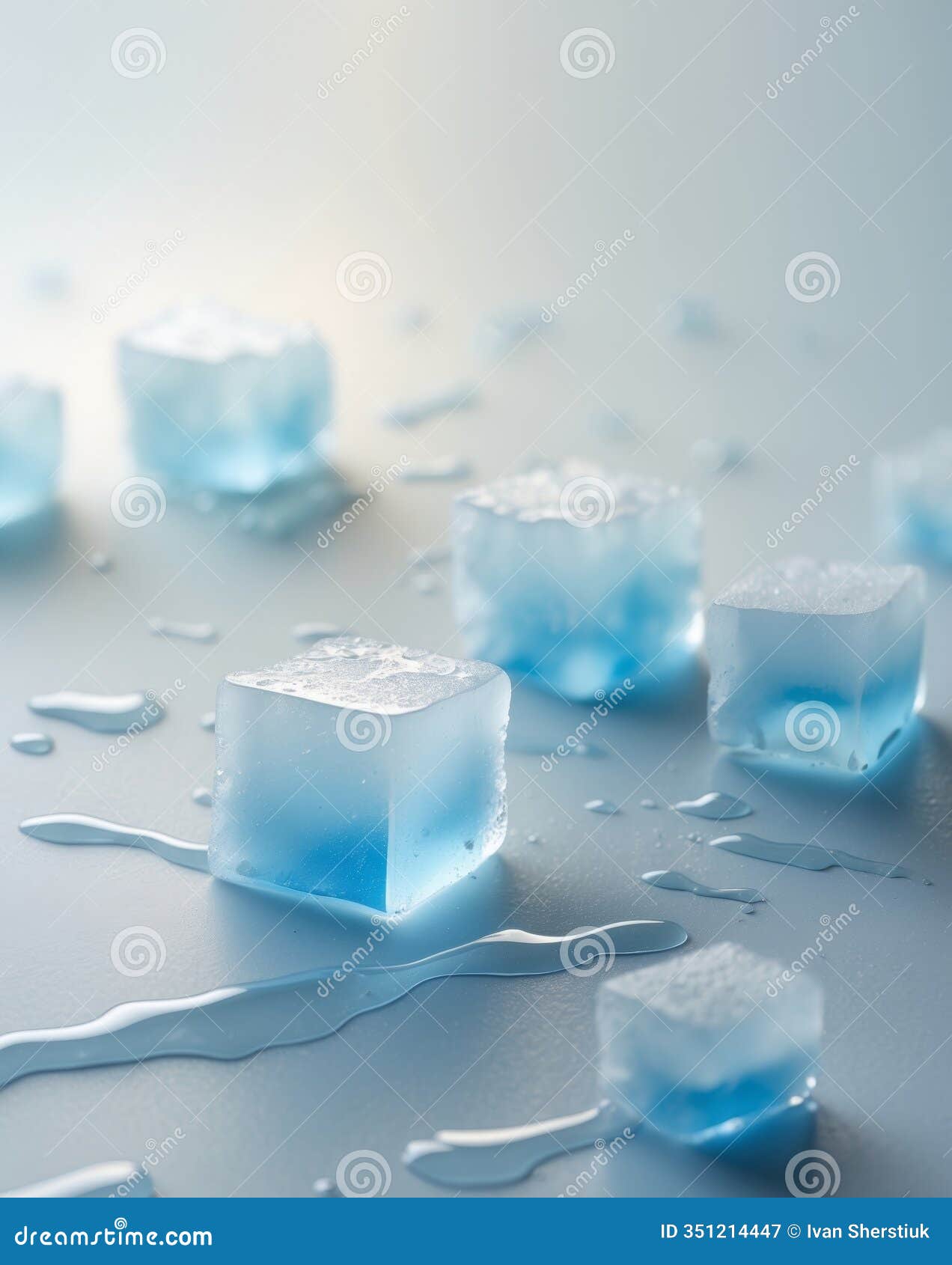 Fresh Ice Cubes on a Soft Blue Background with Melting Water Stock ...