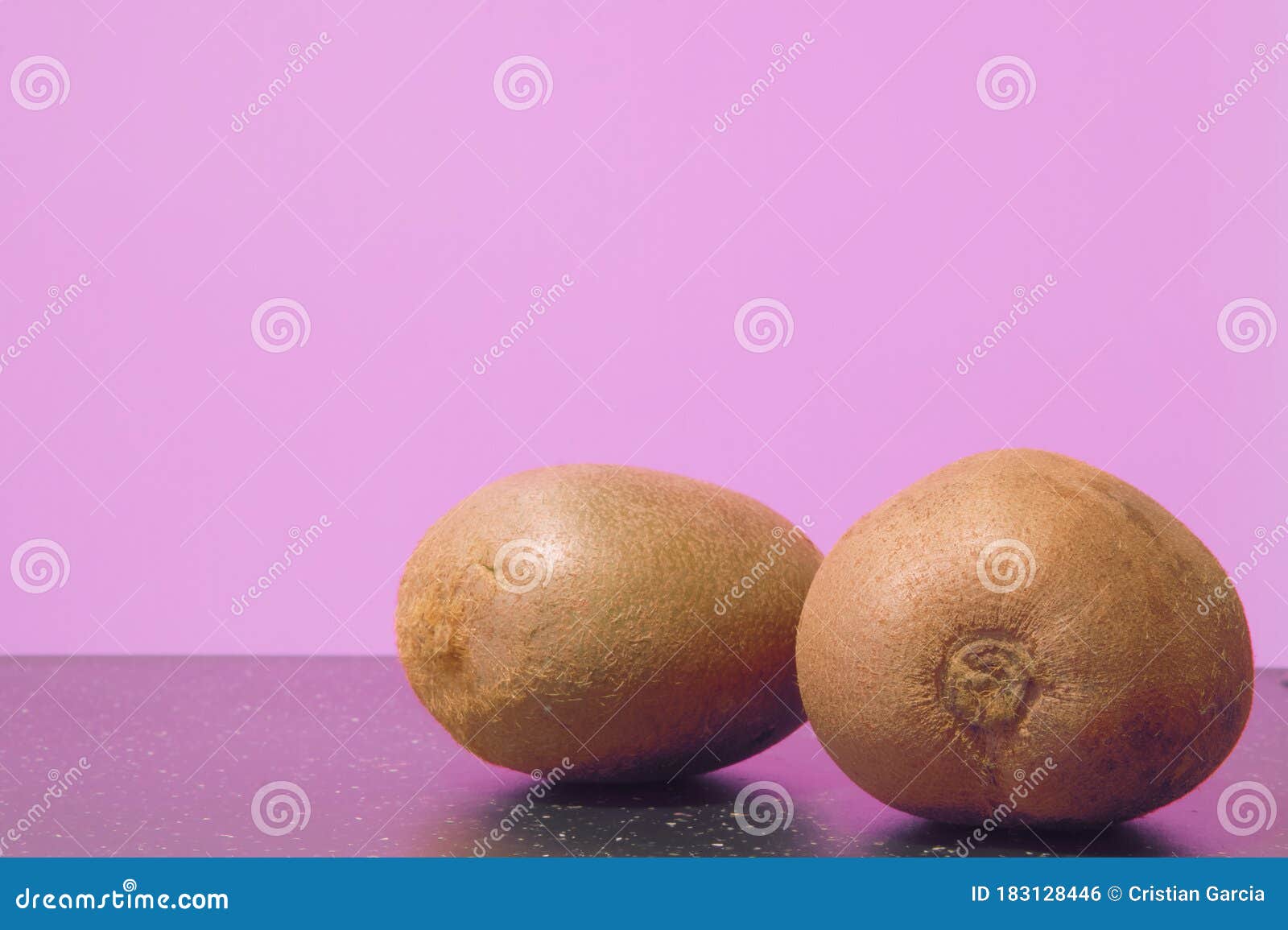 Two Fresh Kiwis on Pink Background Stock Photo - Image of citric ...
