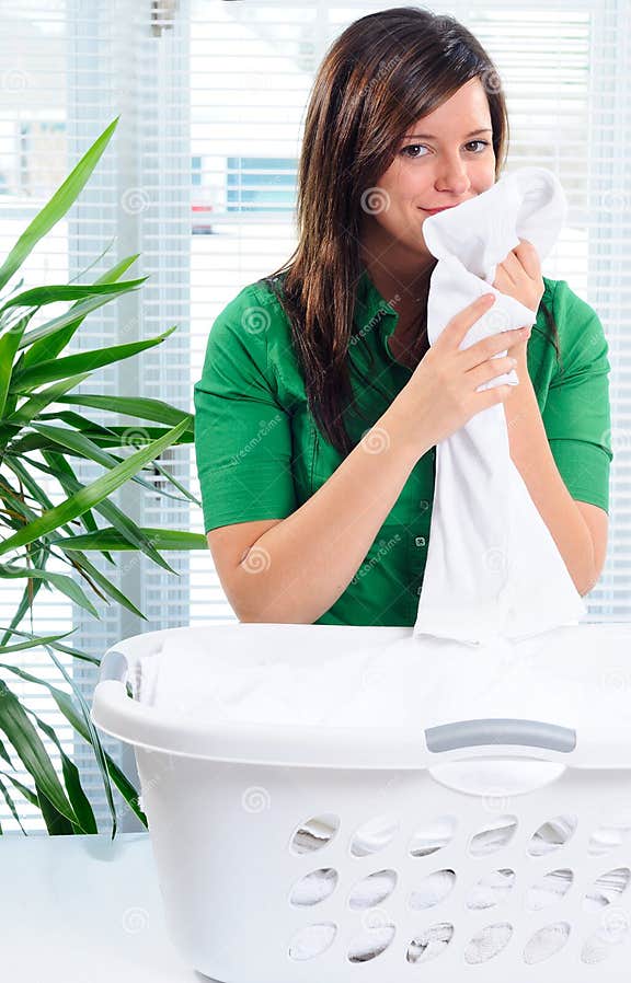 Fresh Laundry stock photo. Image of laundering, fold, brunette - 4752544