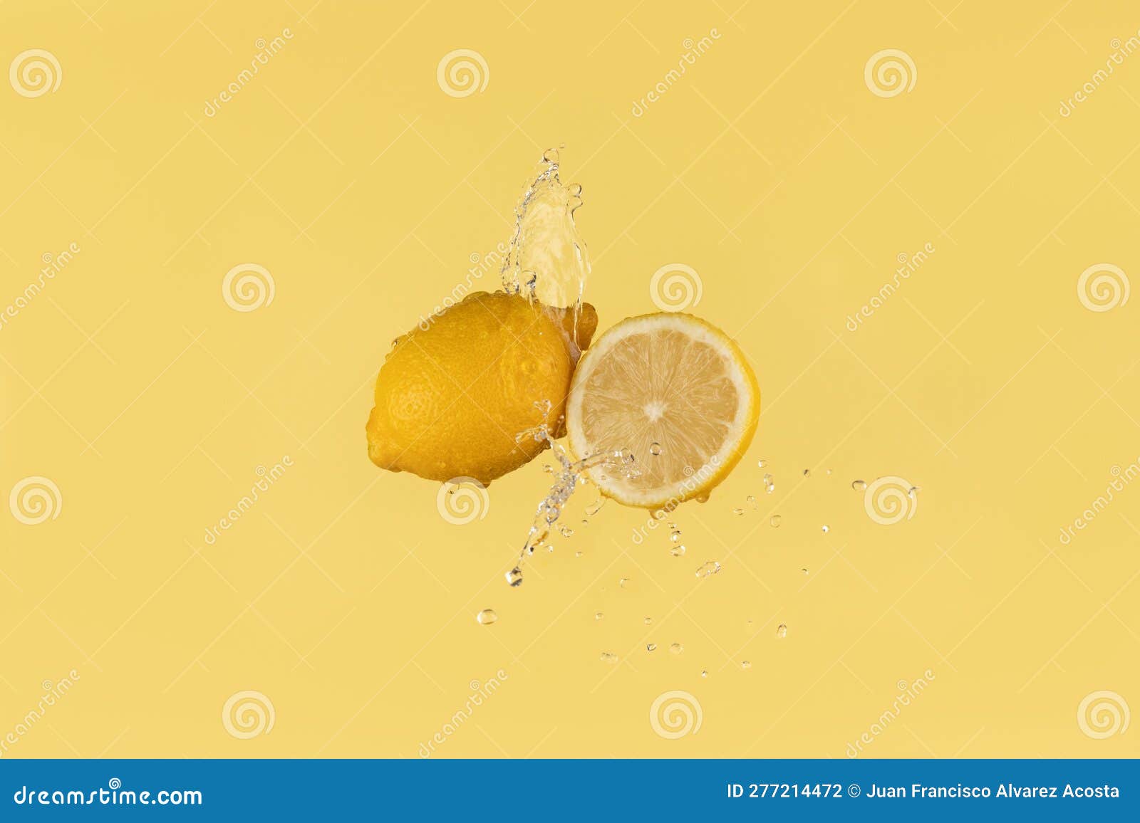Fresh Lemon on Yellow Background with Water Splash Stock Photo - Image ...