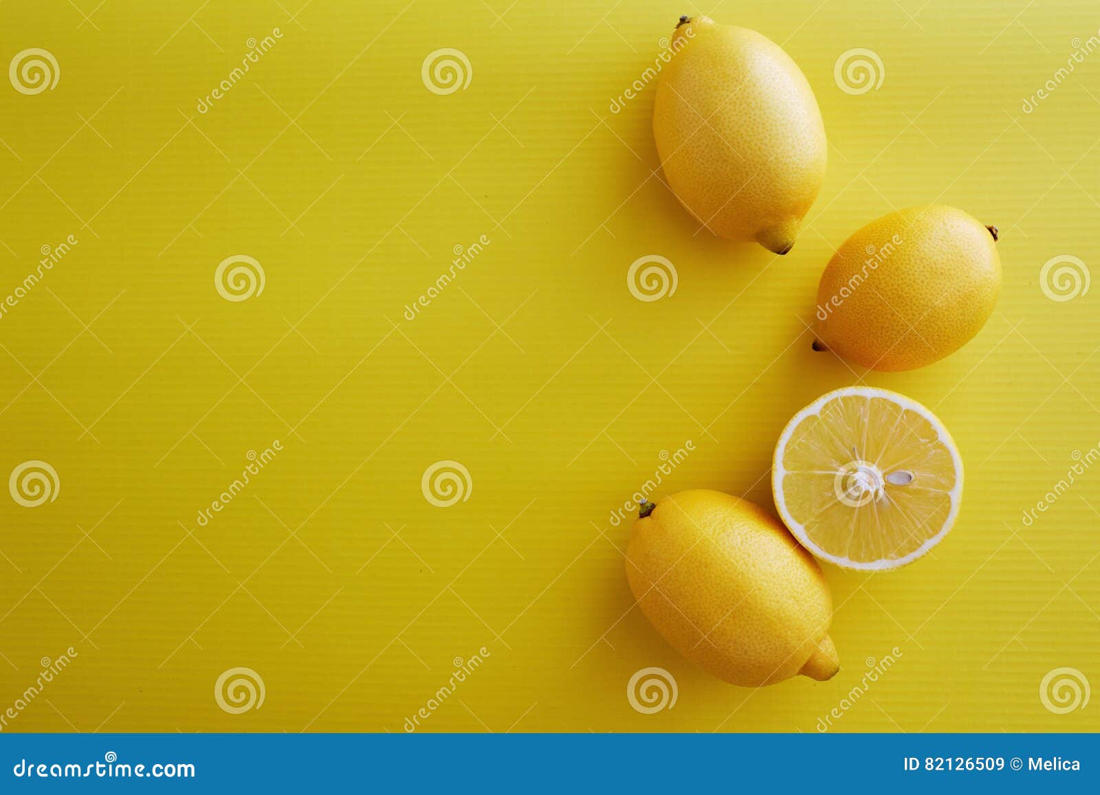 Fresh Lemons Against a Yellow Background Stock Image - Image of indoors ...
