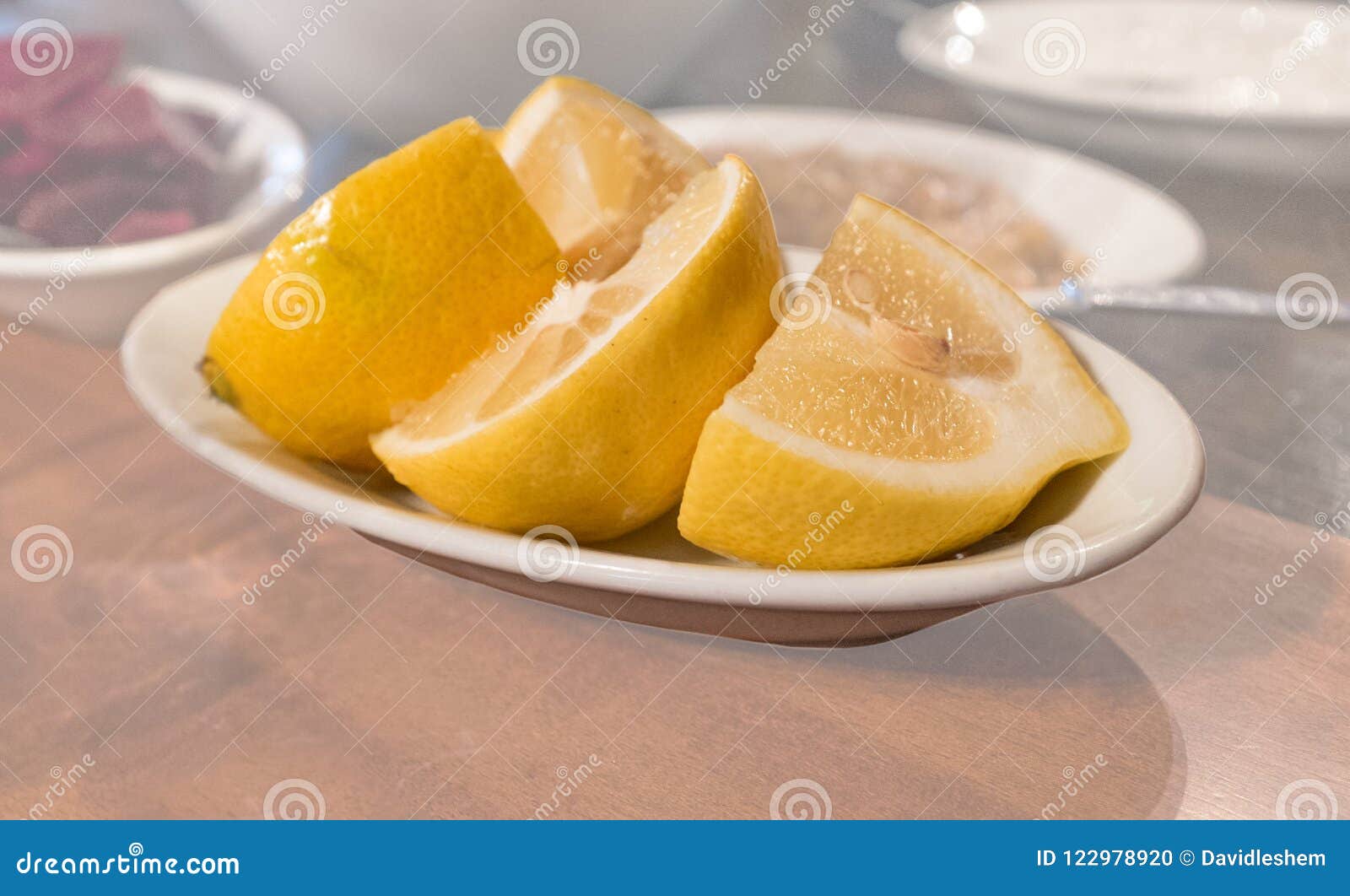 Fresh lemons plate stock photo. Image of health, colour - 122978920