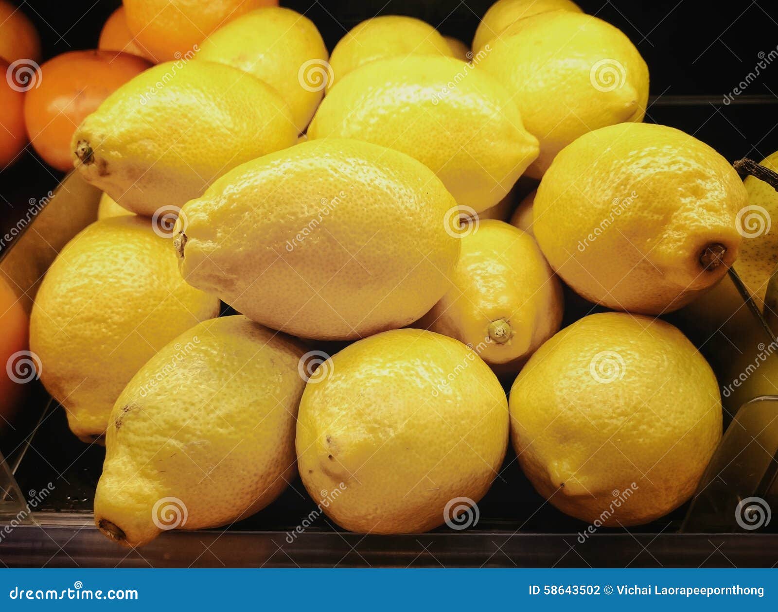 Fresh Lemons in Supermarket Stock Photo - Image of diet, healthy: 58643502