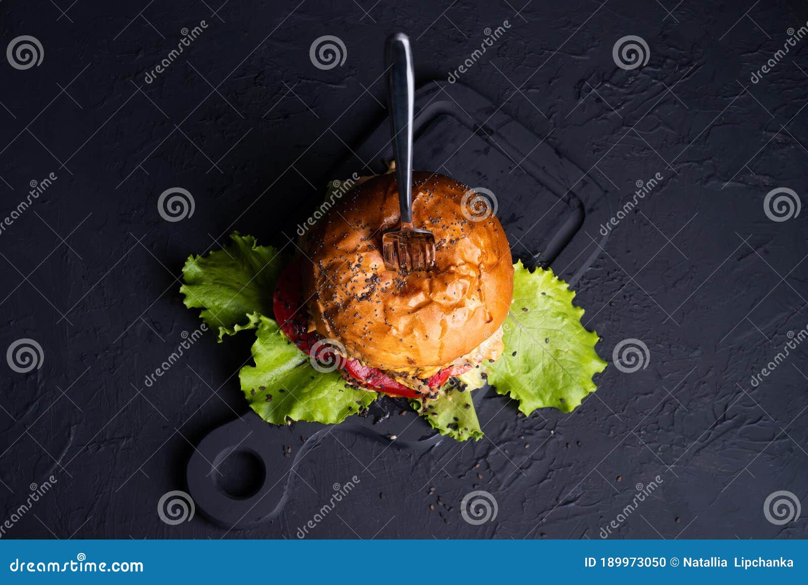 Fresh Lettuce Leaves on Sides, Black Background, Top View Big Burger ...