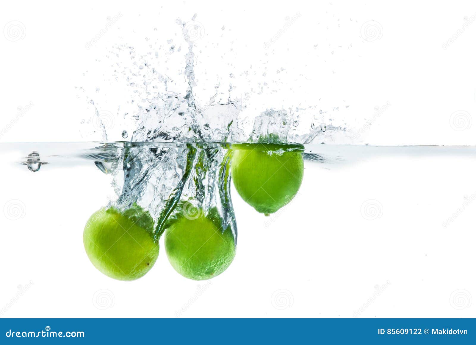 Fresh Lime Dropped into the Water with Water Splash on a White B Stock ...