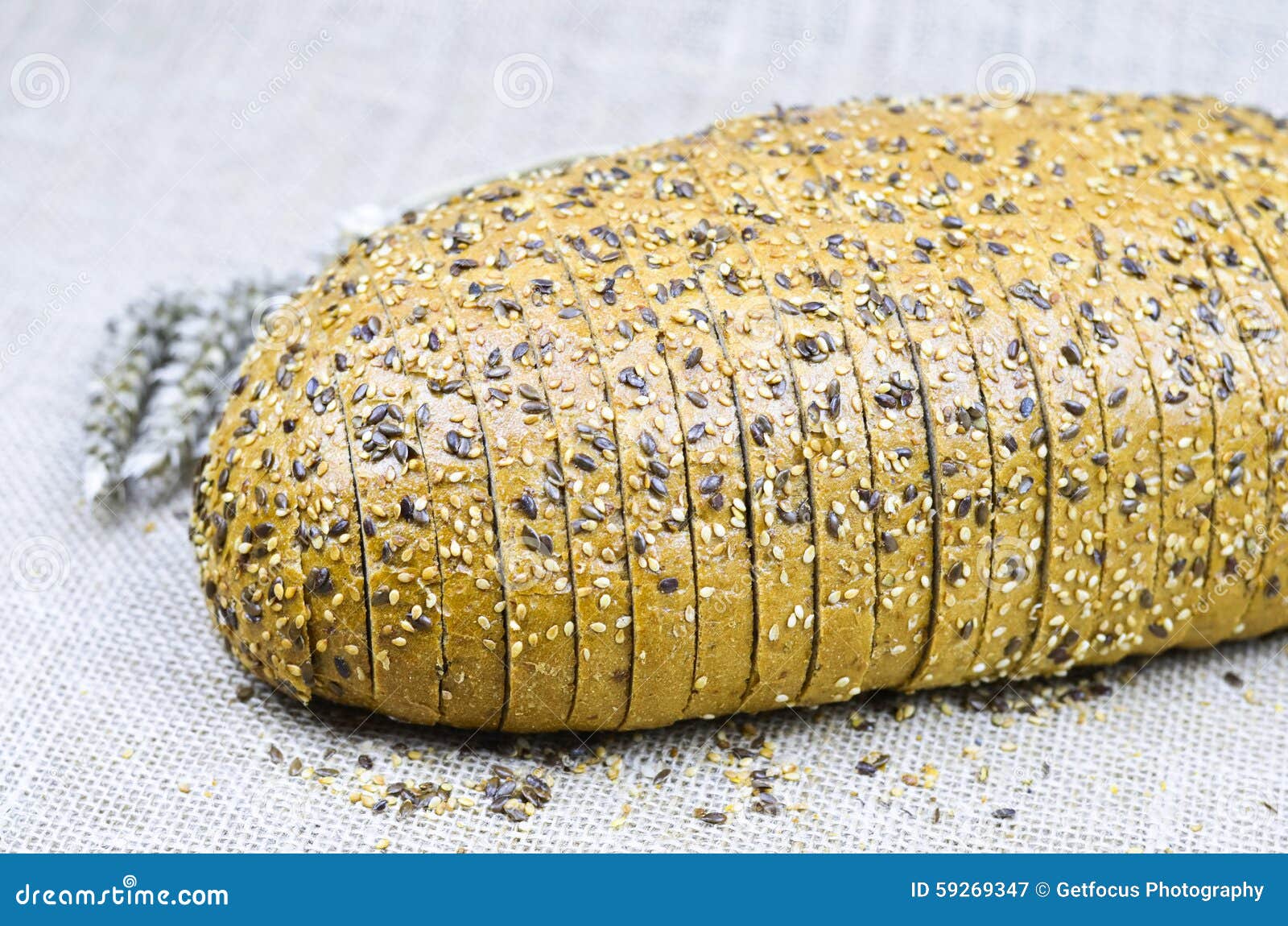 Fresh loaf of bread sliced stock image. Image of linseed - 59269347