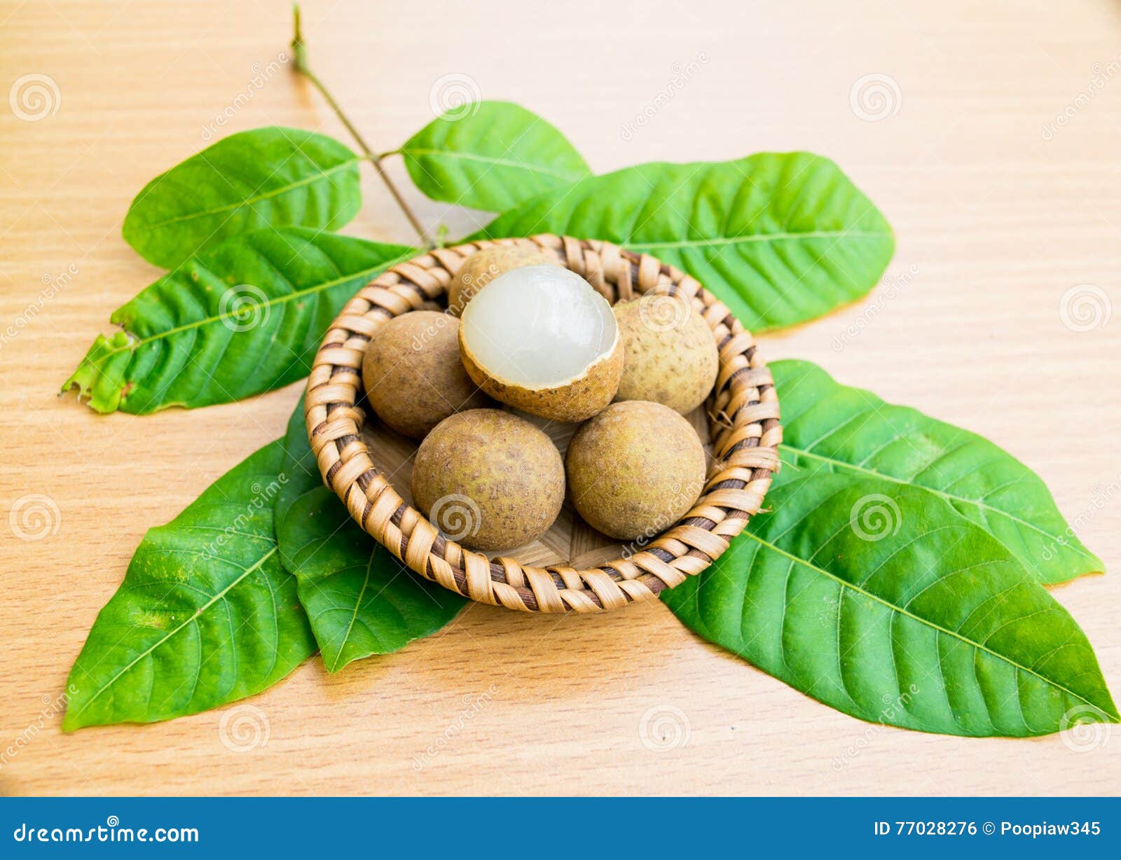 Fresh Longan with Longan Leaf Set on Wooden Table Stock Photo - Image ...