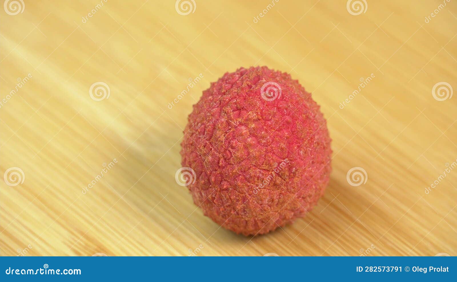 Fresh Lychee Fruit in Shell Rotate in Macro on Wooden Background ...