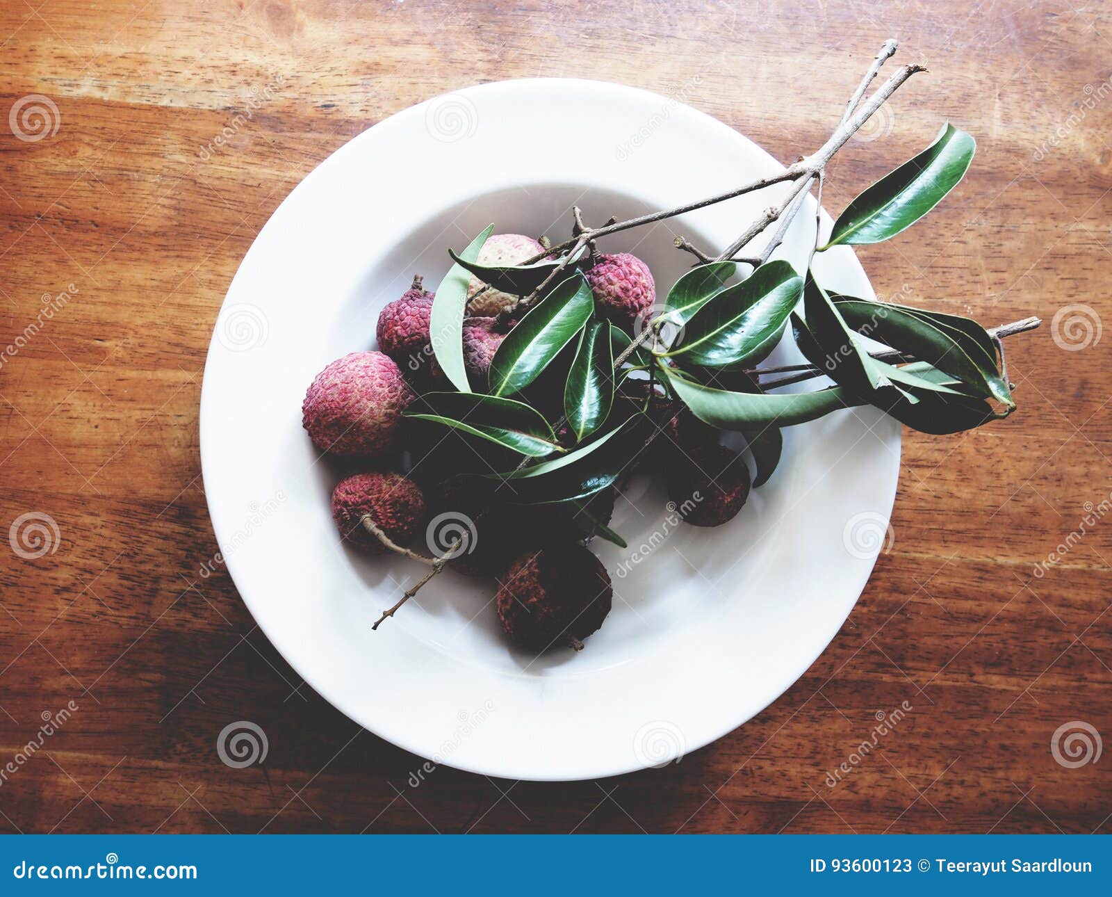 This is Fresh Lychee in White Plate Above Wooden Table, Soft Ton Stock ...
