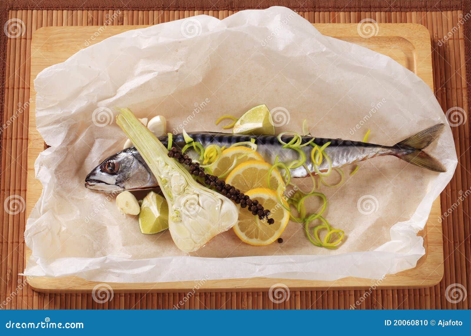 Fresh Mackerel Fish With Lemon And Spices Served On Silver Plate From ...