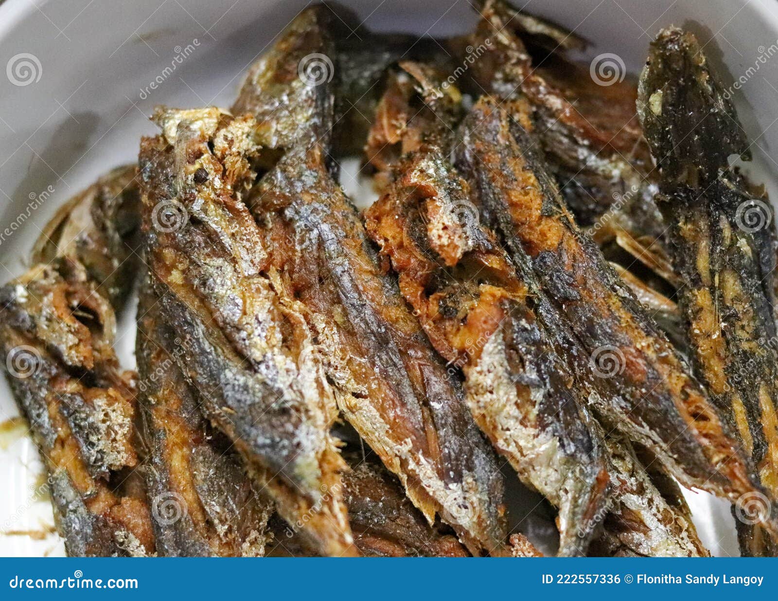 Fresh Malalgis Fish in a Plate that Has Been Fried Stock Photo - Image ...