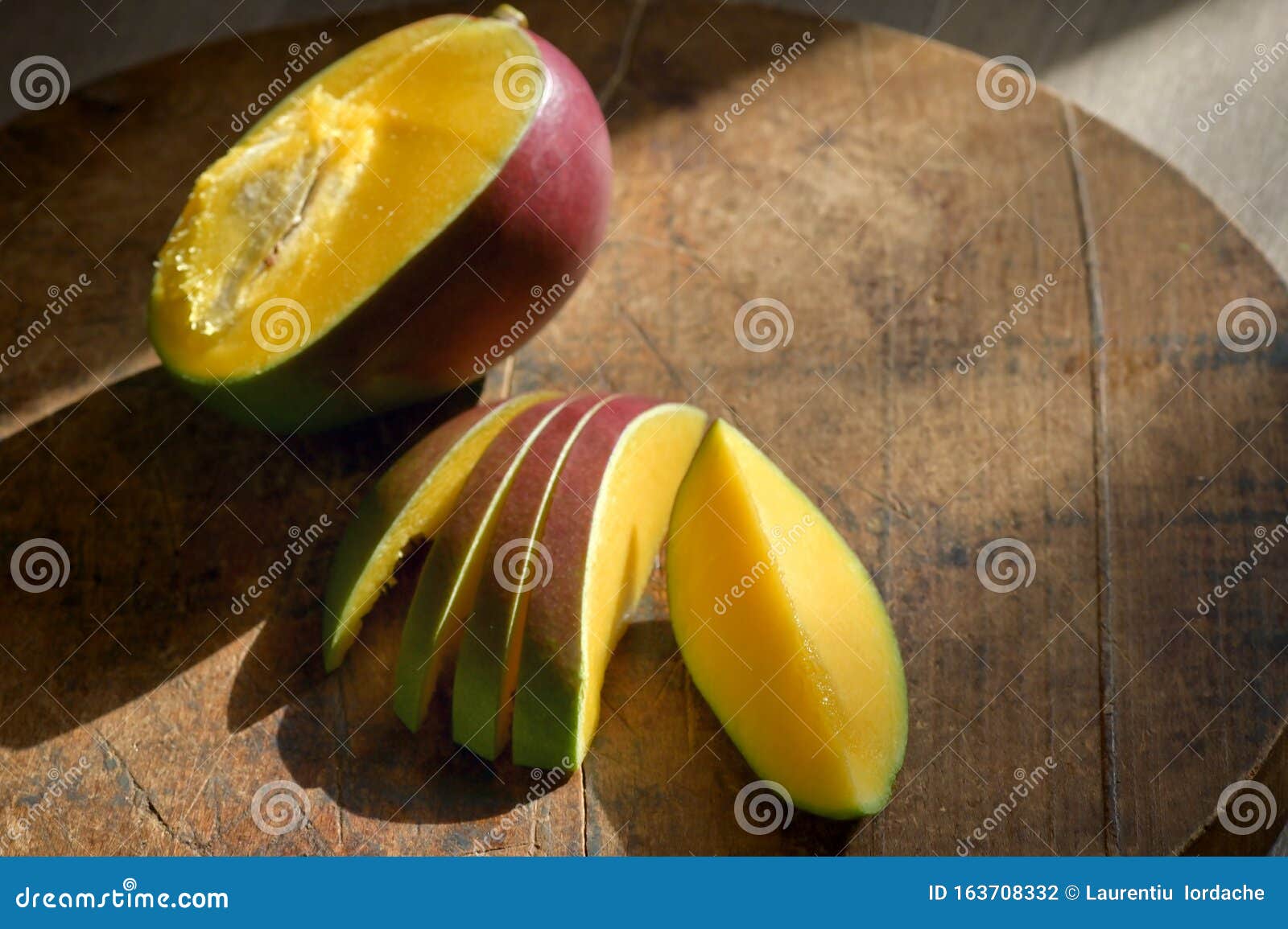 Fresh Mango Fruit on Table stock photo. Image of fruit - 163708332