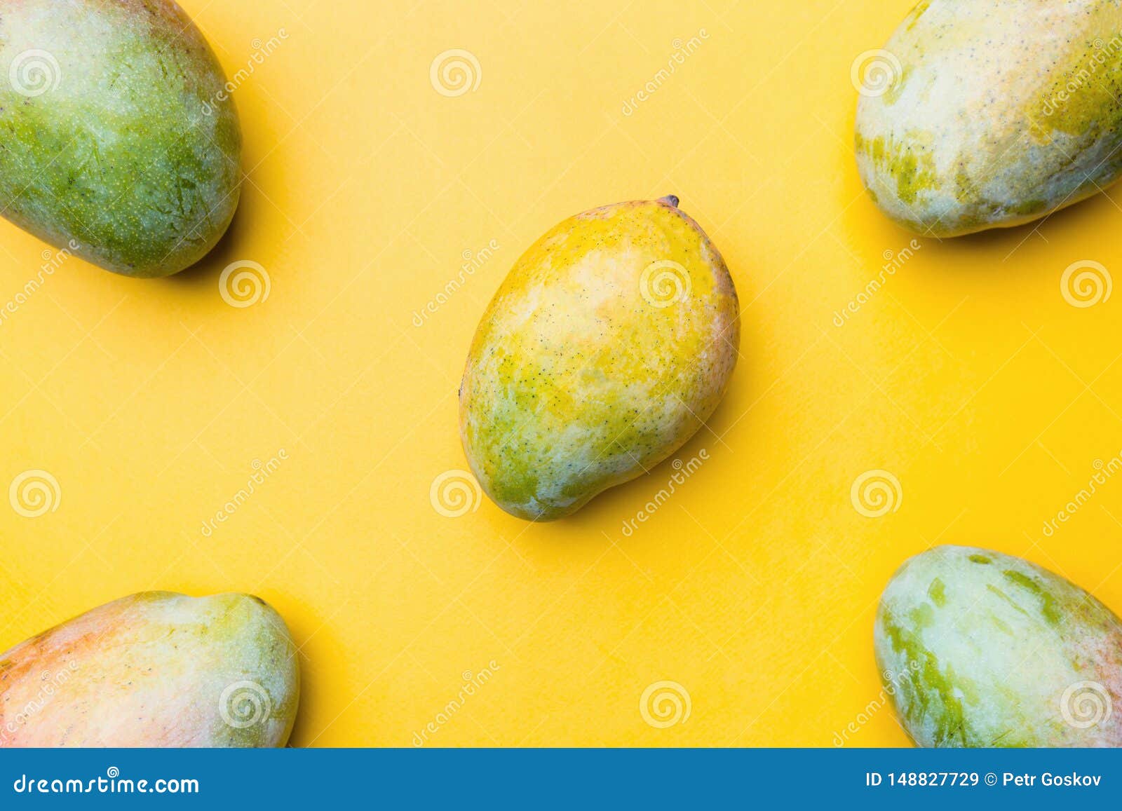 Fresh mango on yellow stock image. Image of leaf, horizontal - 148827729