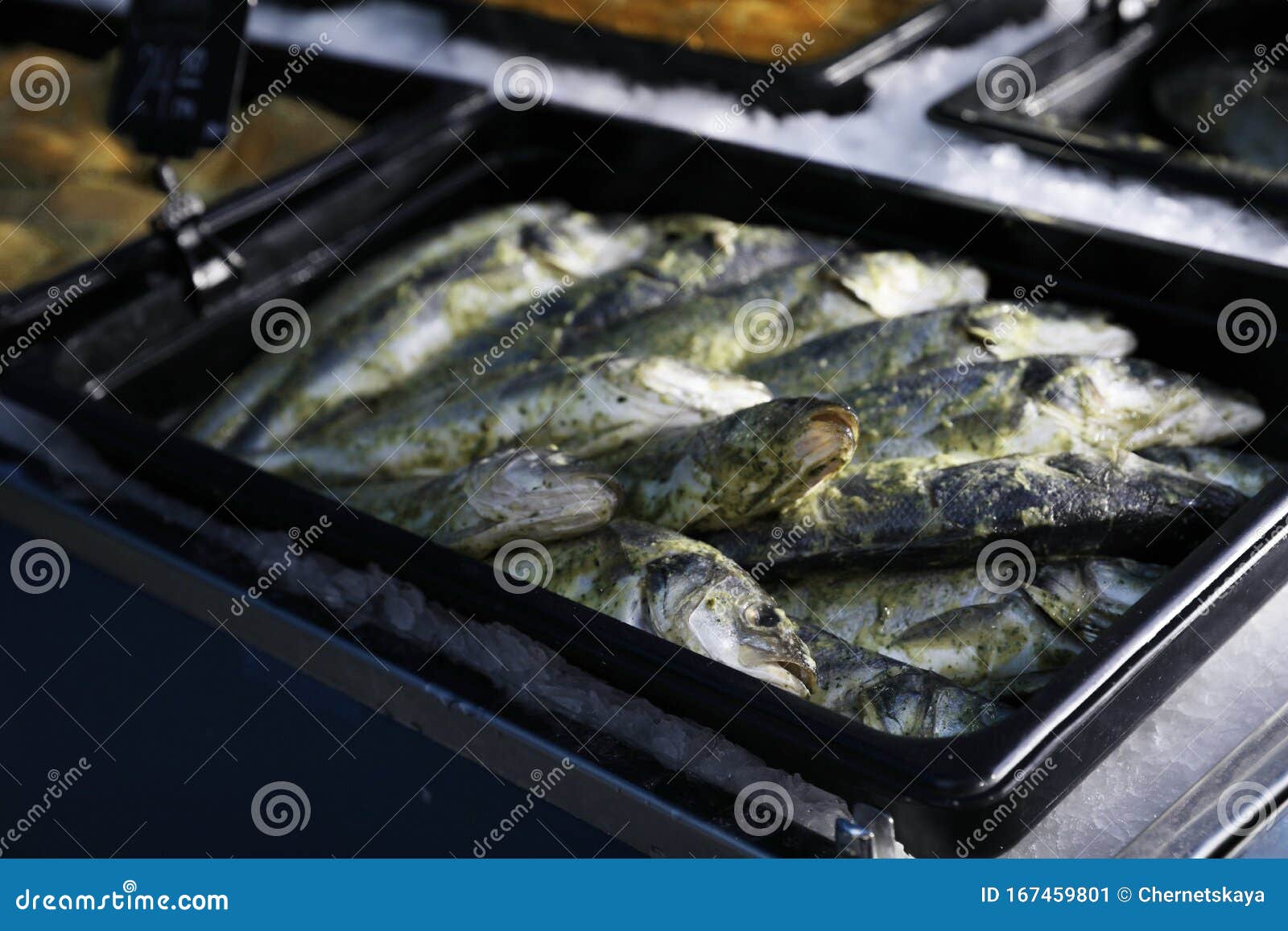 Fresh Marinated Fish in Container on Display Stock Image - Image of ...