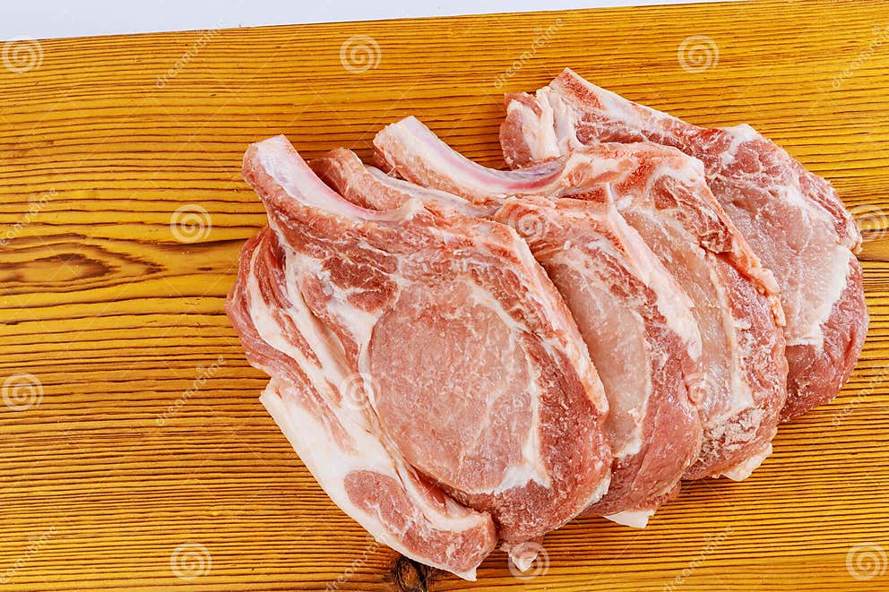 Fresh Meat Portion Comprised of Raw Pork Steaks, Ready for a Marinating ...
