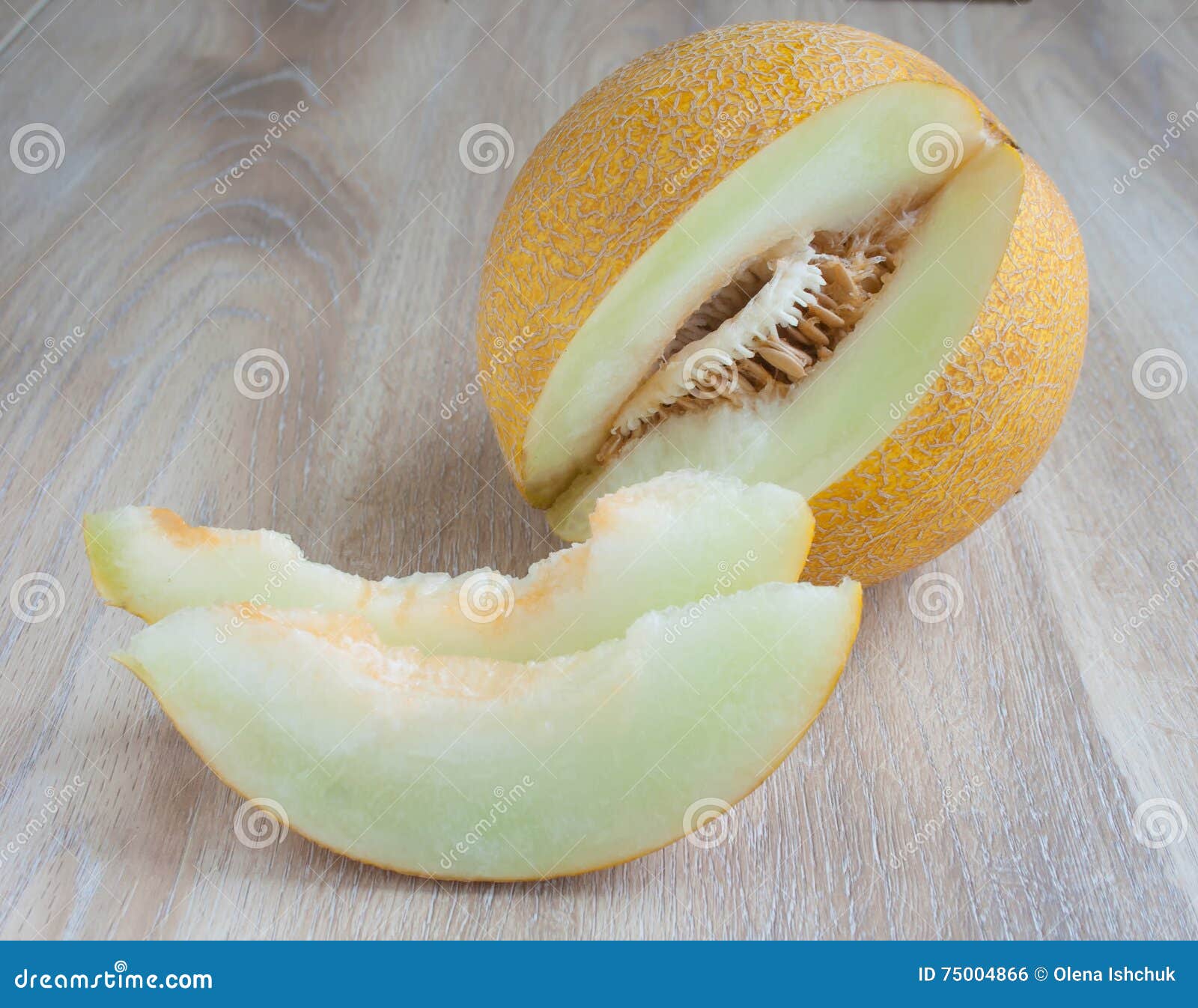 Fresh Melon with Two Pieces on a Beige Background Stock Photo - Image ...