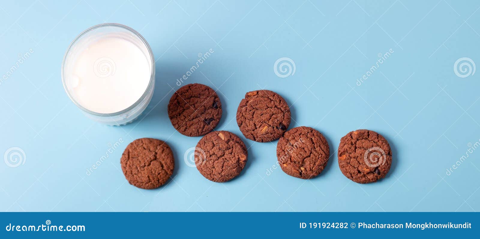 Fresh Milk and Cookies on a Blue Background Stock Photo - Image of ...