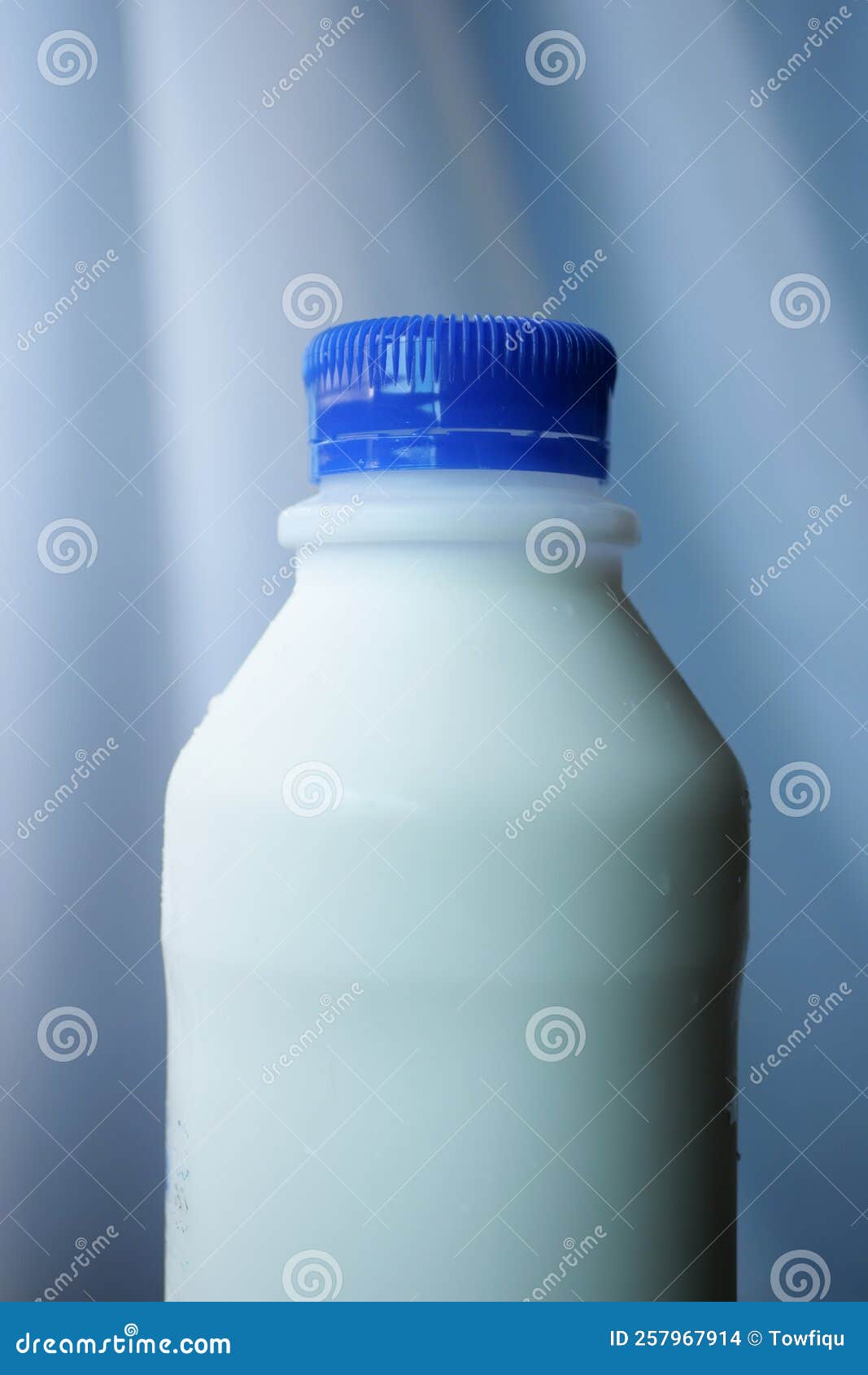 Fresh Milk in a Plastic Container on Table Stock Photo - Image of ...