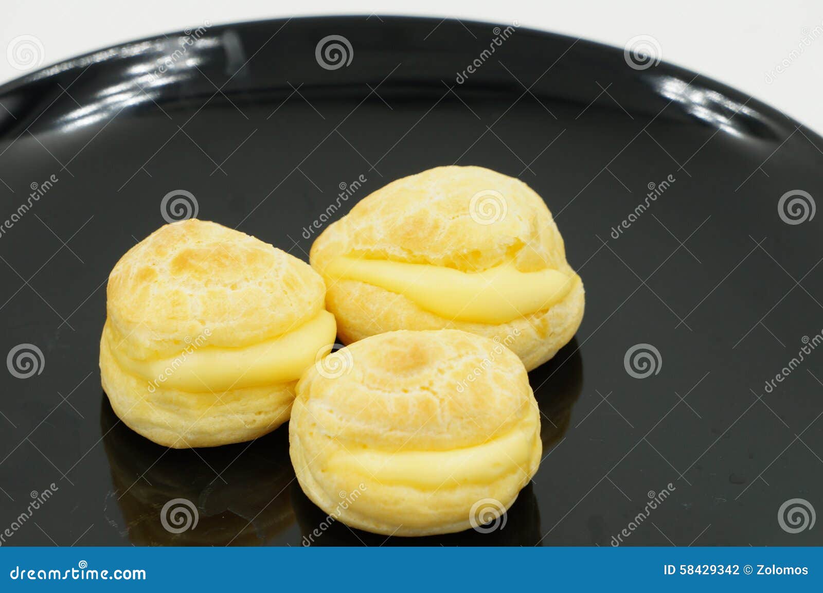 Fresh Mini Cream puffs stock photo. Image of filled, photograph - 58429342