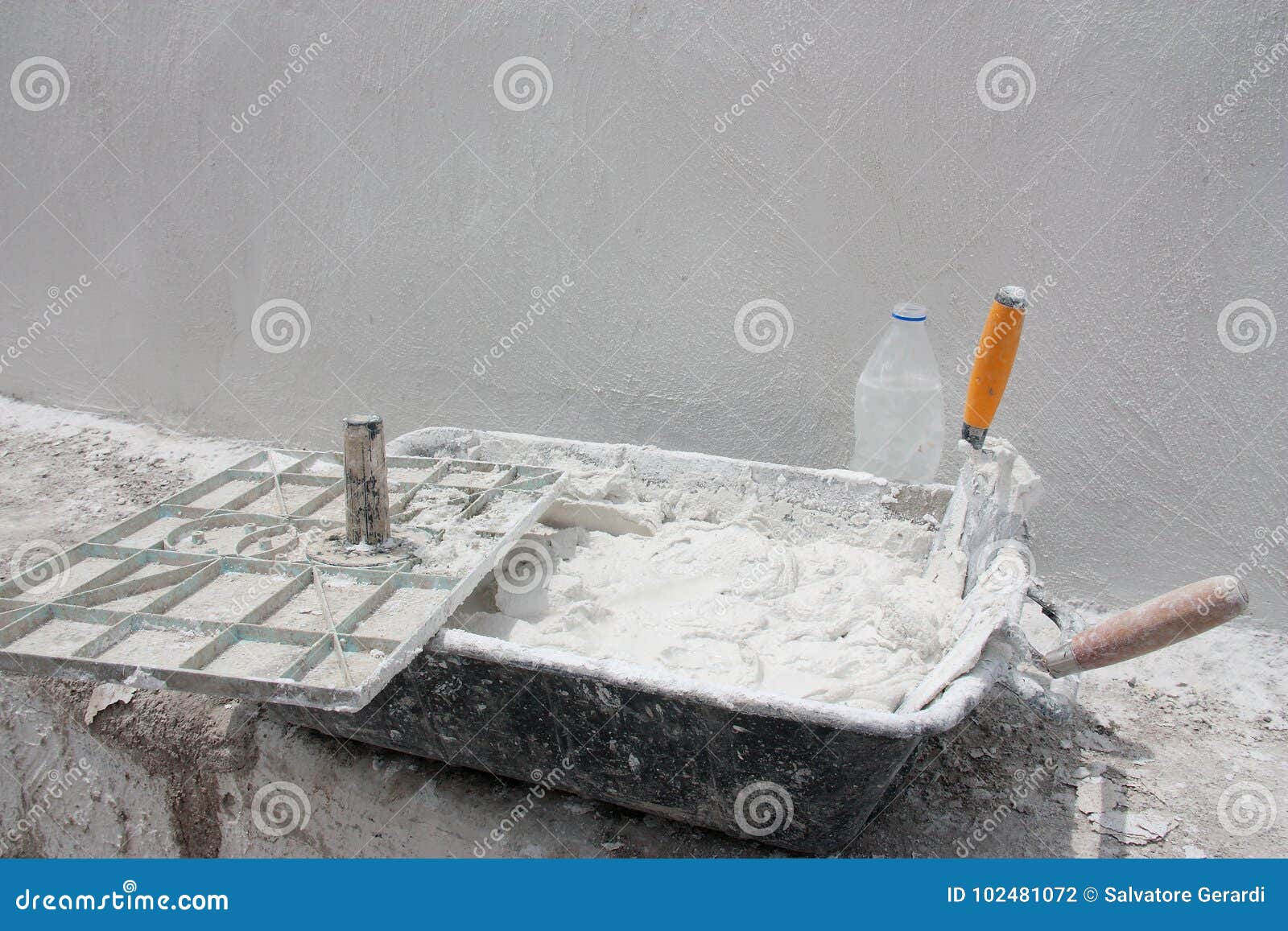 Fresh Mortar in a Container with Trowels and Other Bricklayer Tools ...