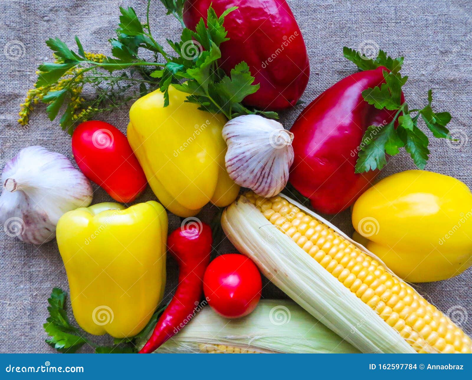 Fresh Multi-colored Vegetables on the Table with Greens Stock Photo ...