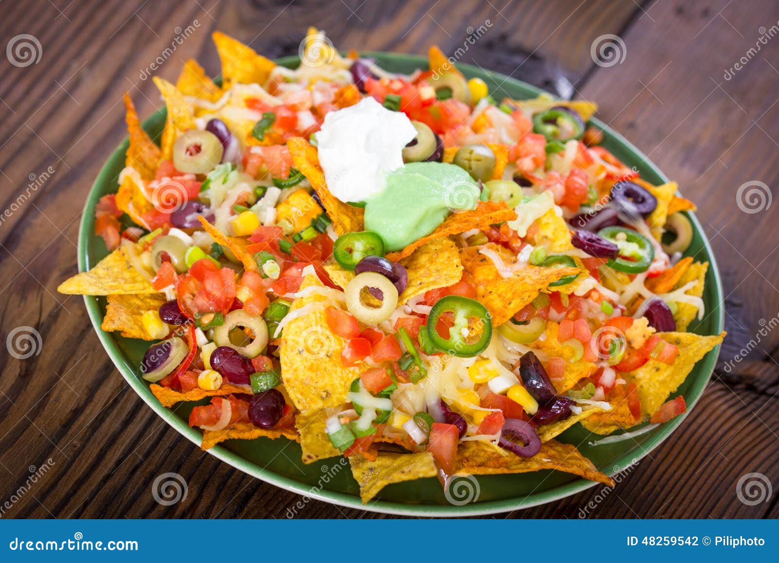 Fresh nachos on the table stock photo. Image of chip - 48259542