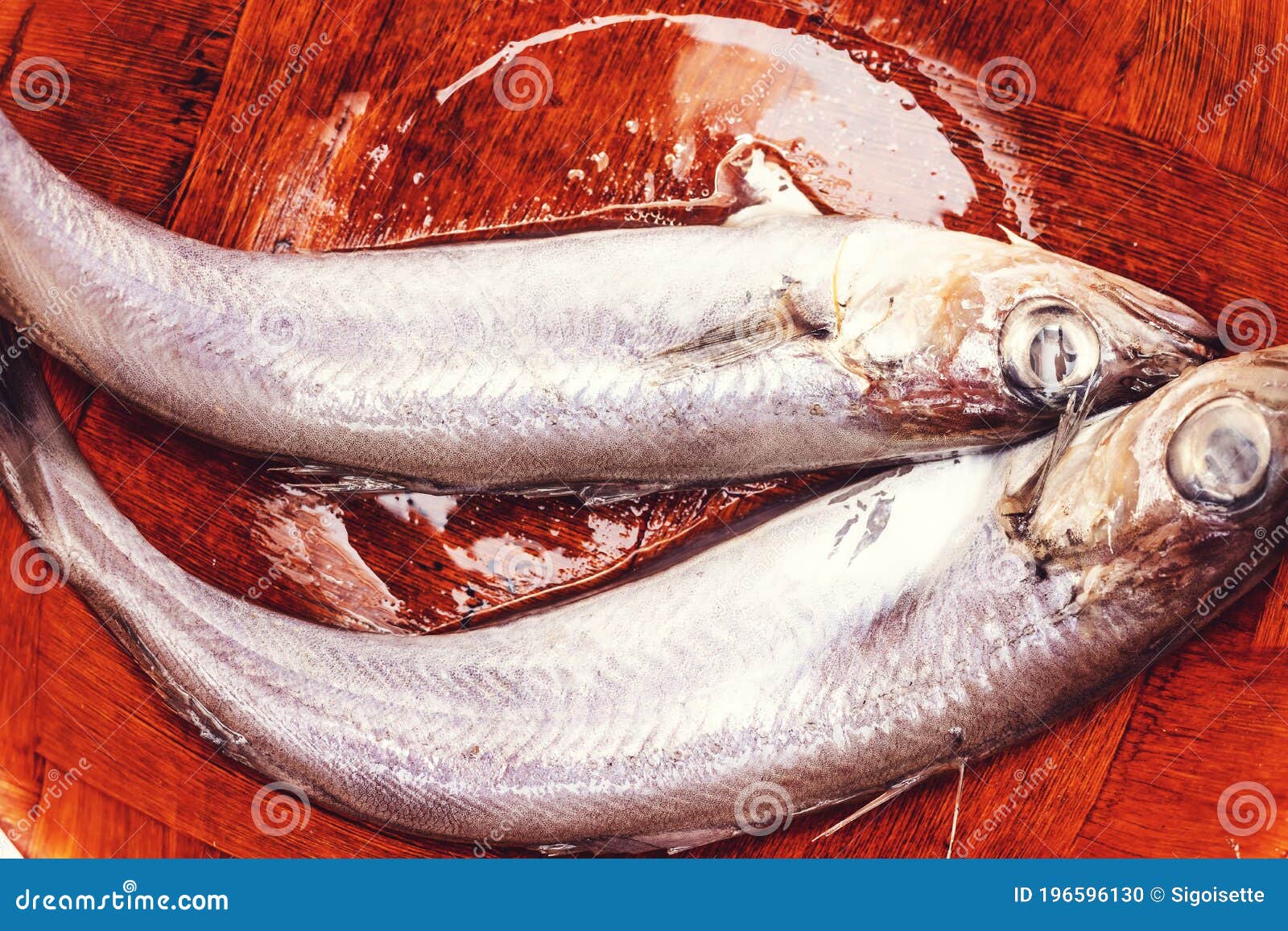 Blue Whiting Or Lilies, Fish On The Table Prepared To Be Cleaned And ...