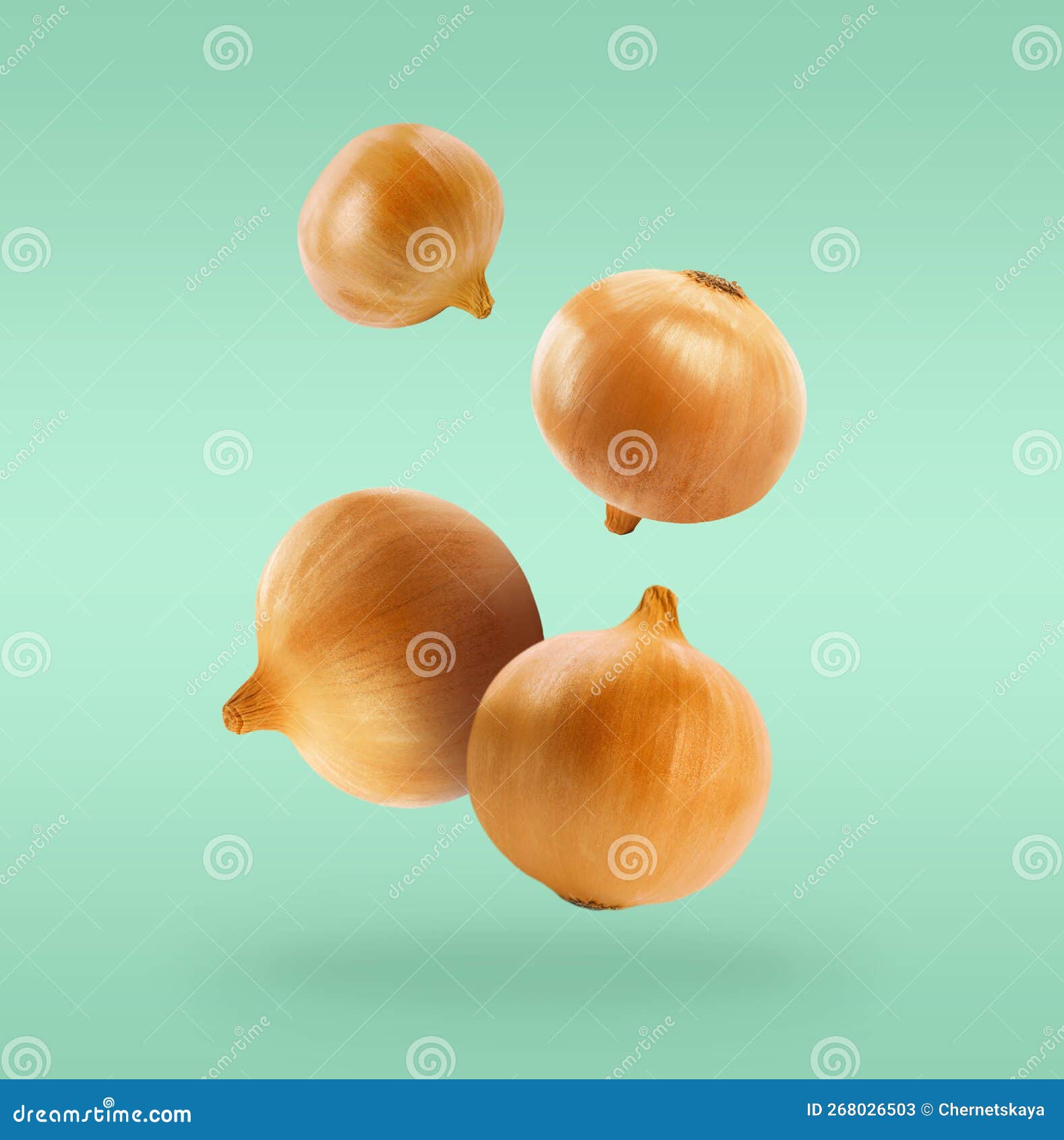 Fresh Onion Bulbs Falling on Light Turquoise Background Stock Image ...