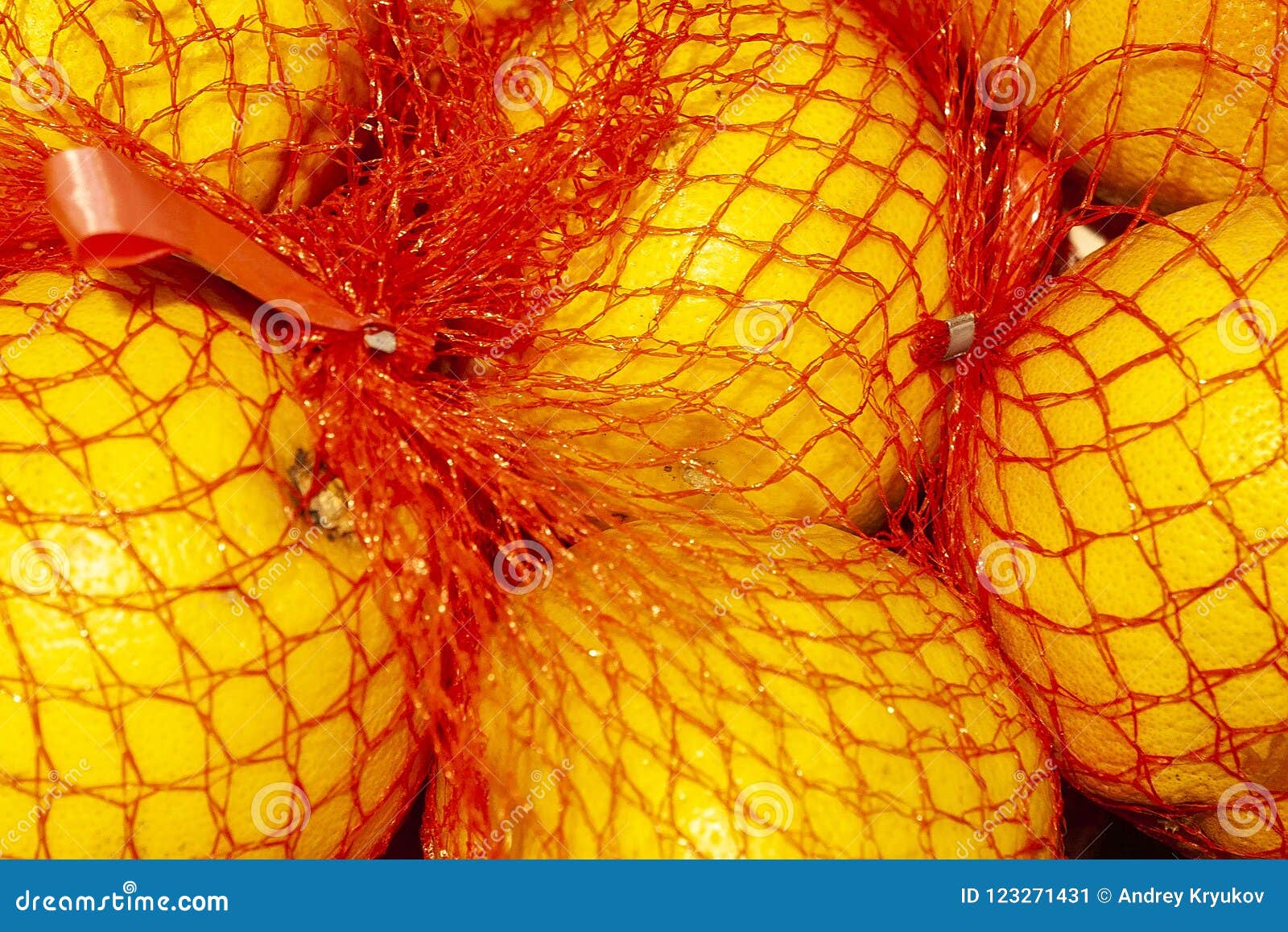 Fresh Oranges Packed in Bright Crane Mesh. Stock Image - Image of leaf ...