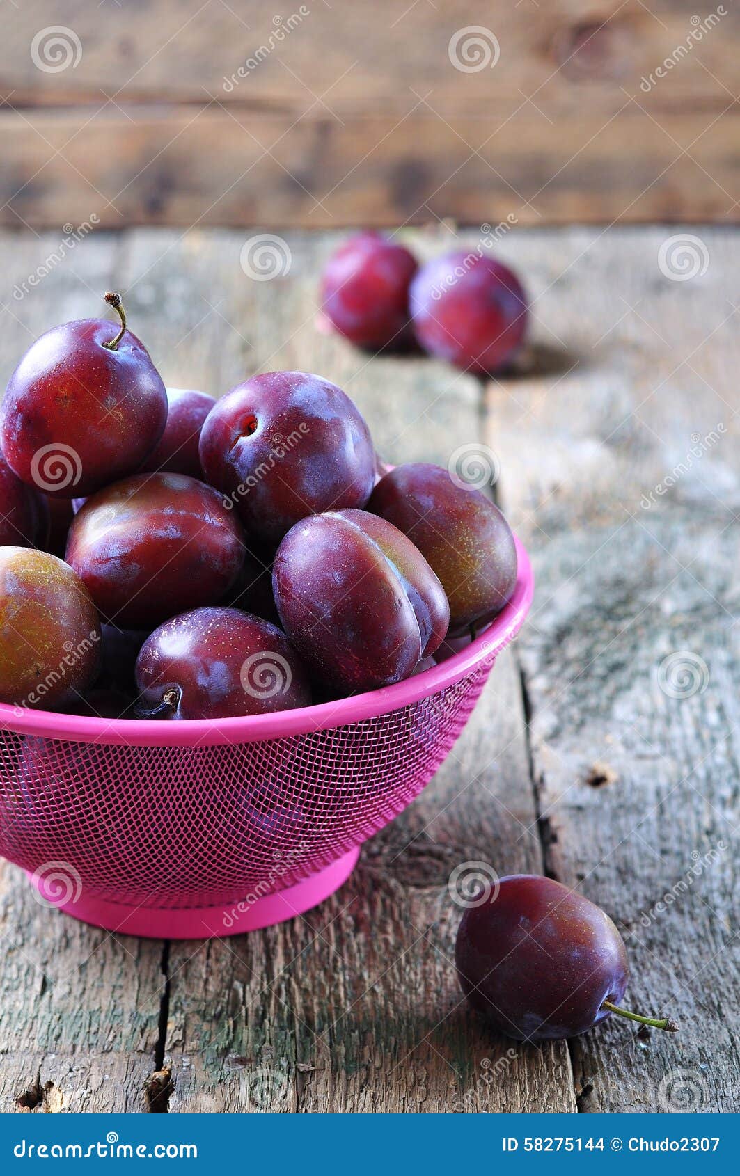 Fresh Organic Plums in a Basket on a Wooden Table Stock Photo - Image ...