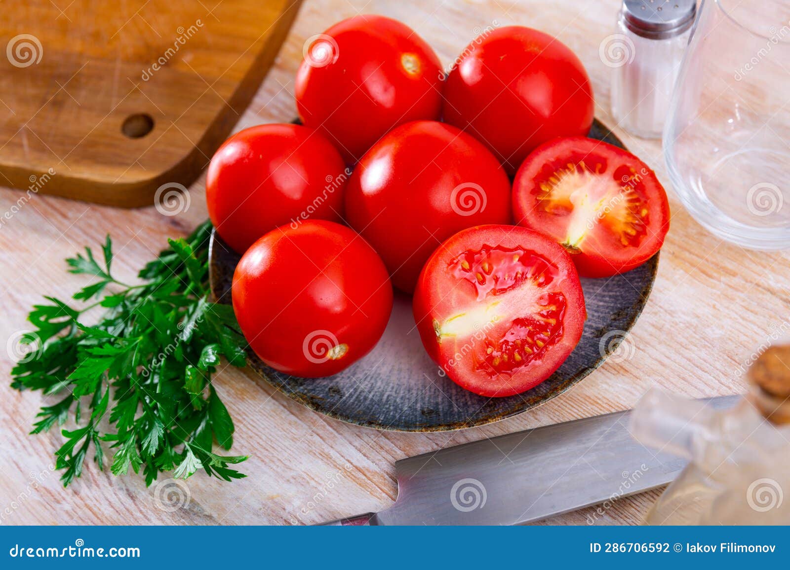 Fresh Organic Tomatoes on Wooden Kitchen Table Stock Photo - Image of ...