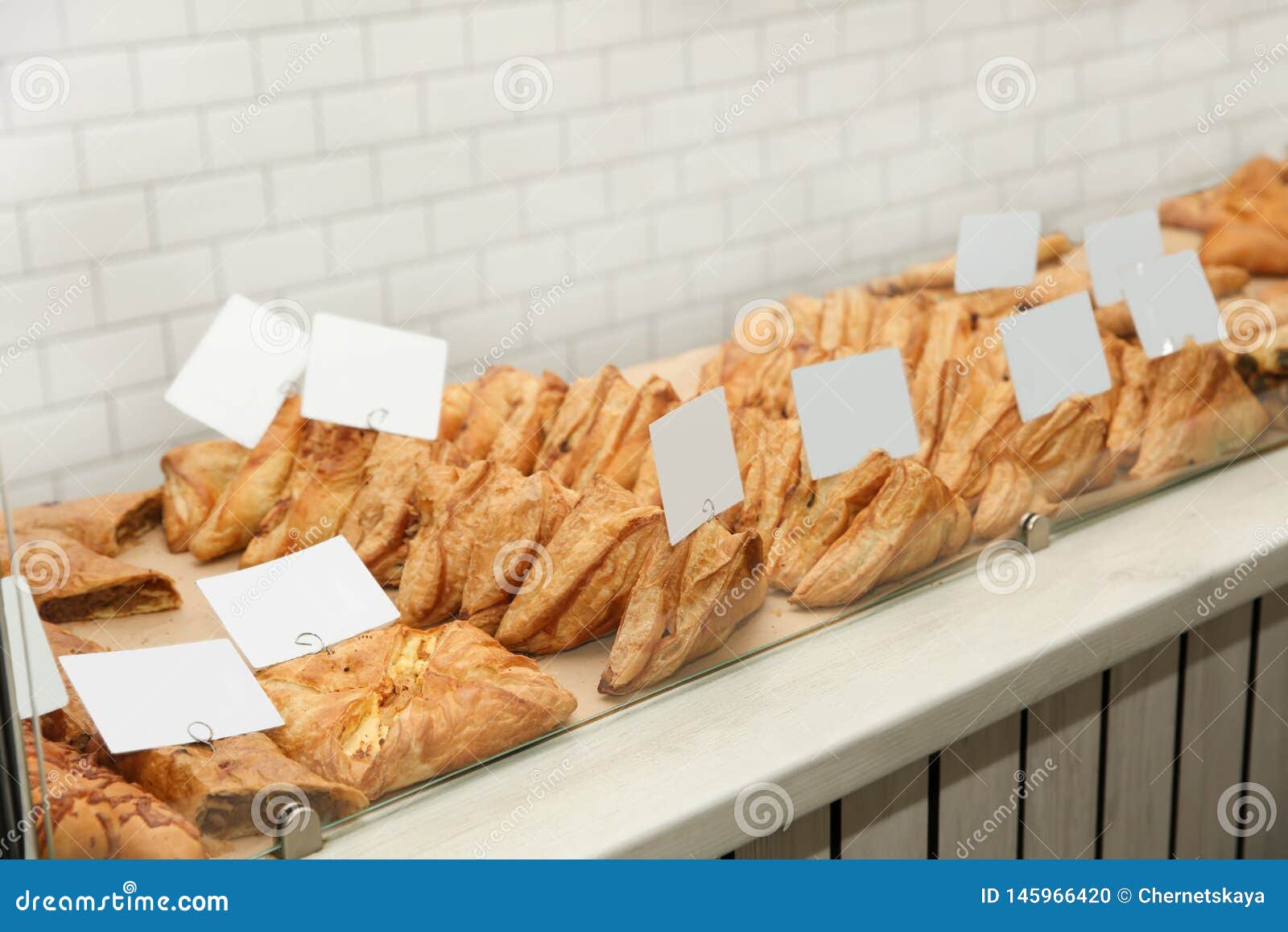 Fresh Pastries on Counter in Bakery Store Stock Photo - Image of ...