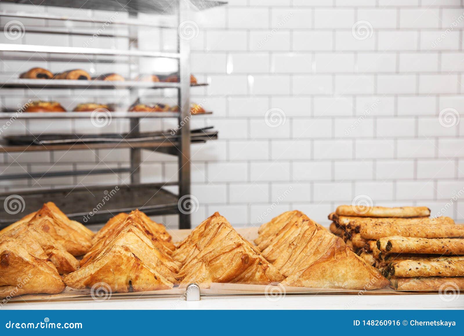 Fresh Pastries on Counter in Bakery Store Stock Photo - Image of ...