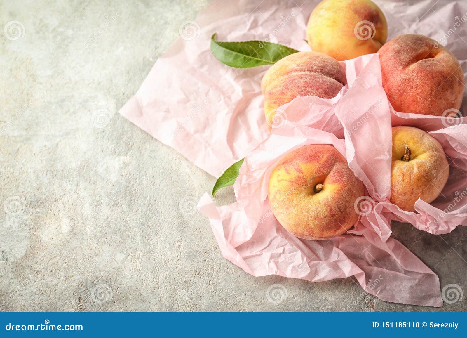 Fresh Peaches and Parchment Paper on Light Table Stock Photo - Image of ...