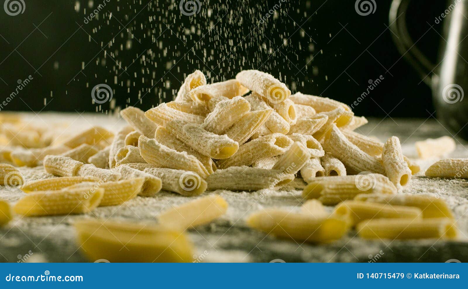 Fresh Penne Rigate Pasta with Flour on Kitchen Table Stock Image ...