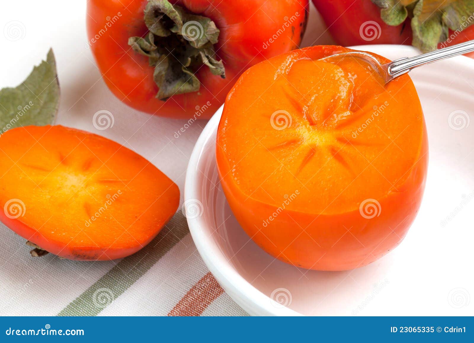 Fresh Persimmon with a Spoon Stock Image - Image of orange, fruit: 23065335