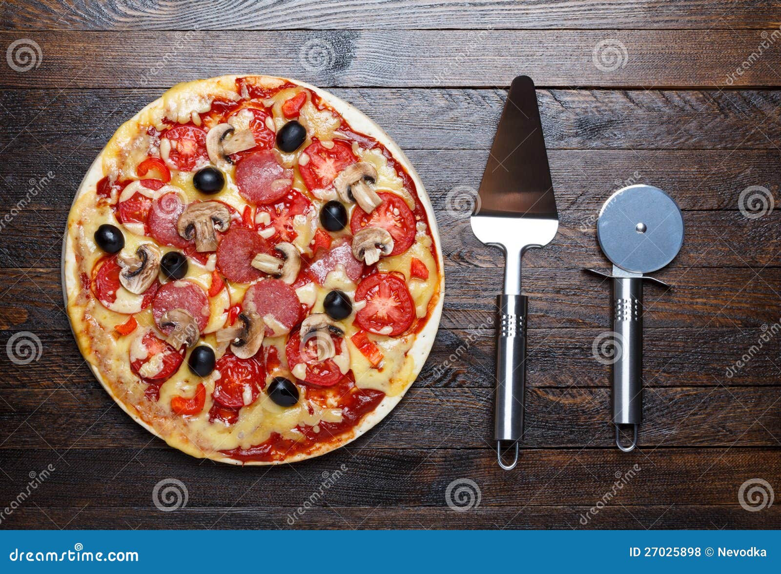 Fresh pizza with lifter stock photo. Image of cutter - 27025898