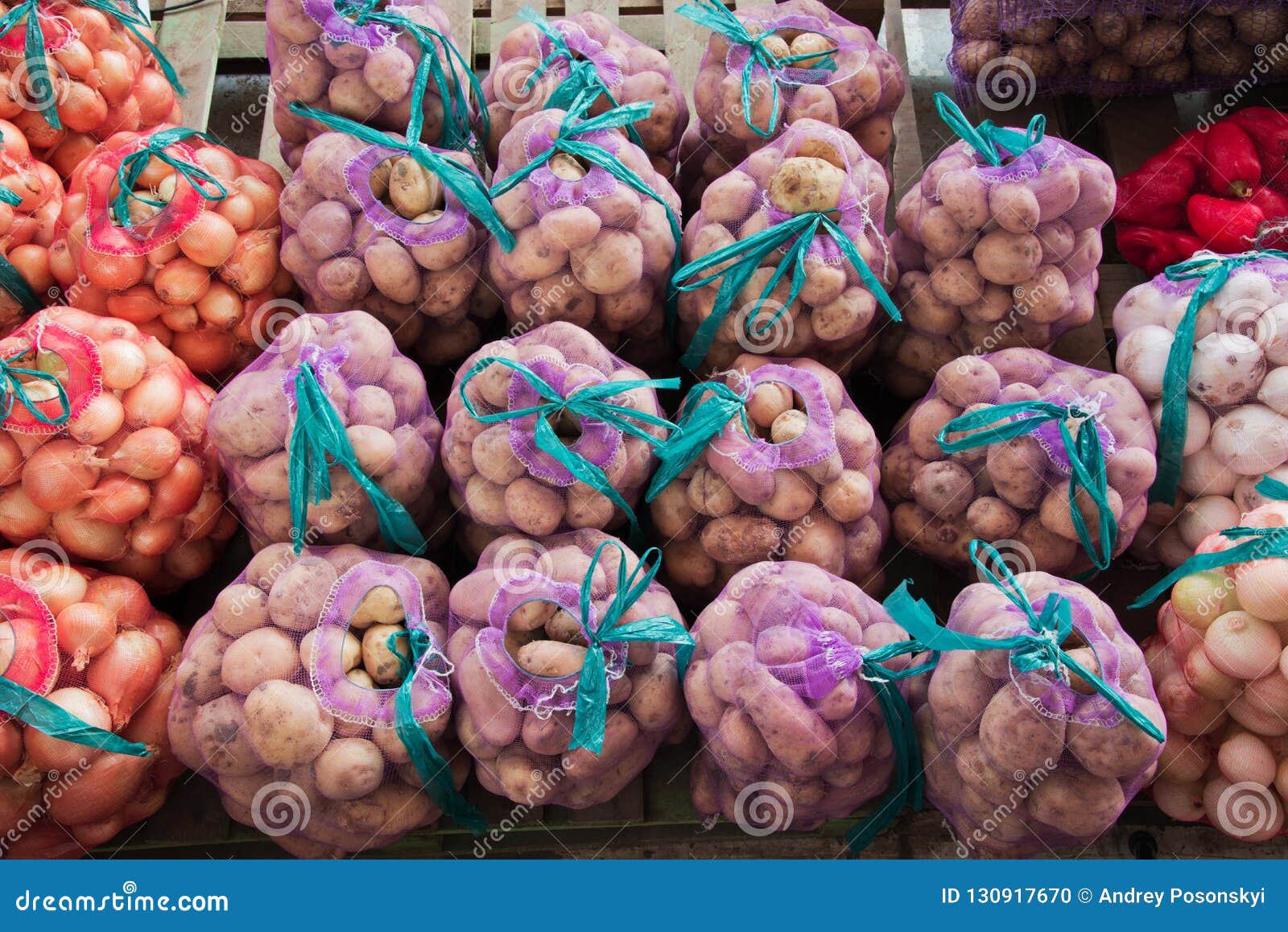 Fresh Potatoes in Nets Bags Stock Photo - Image of agriculture, bazaar ...