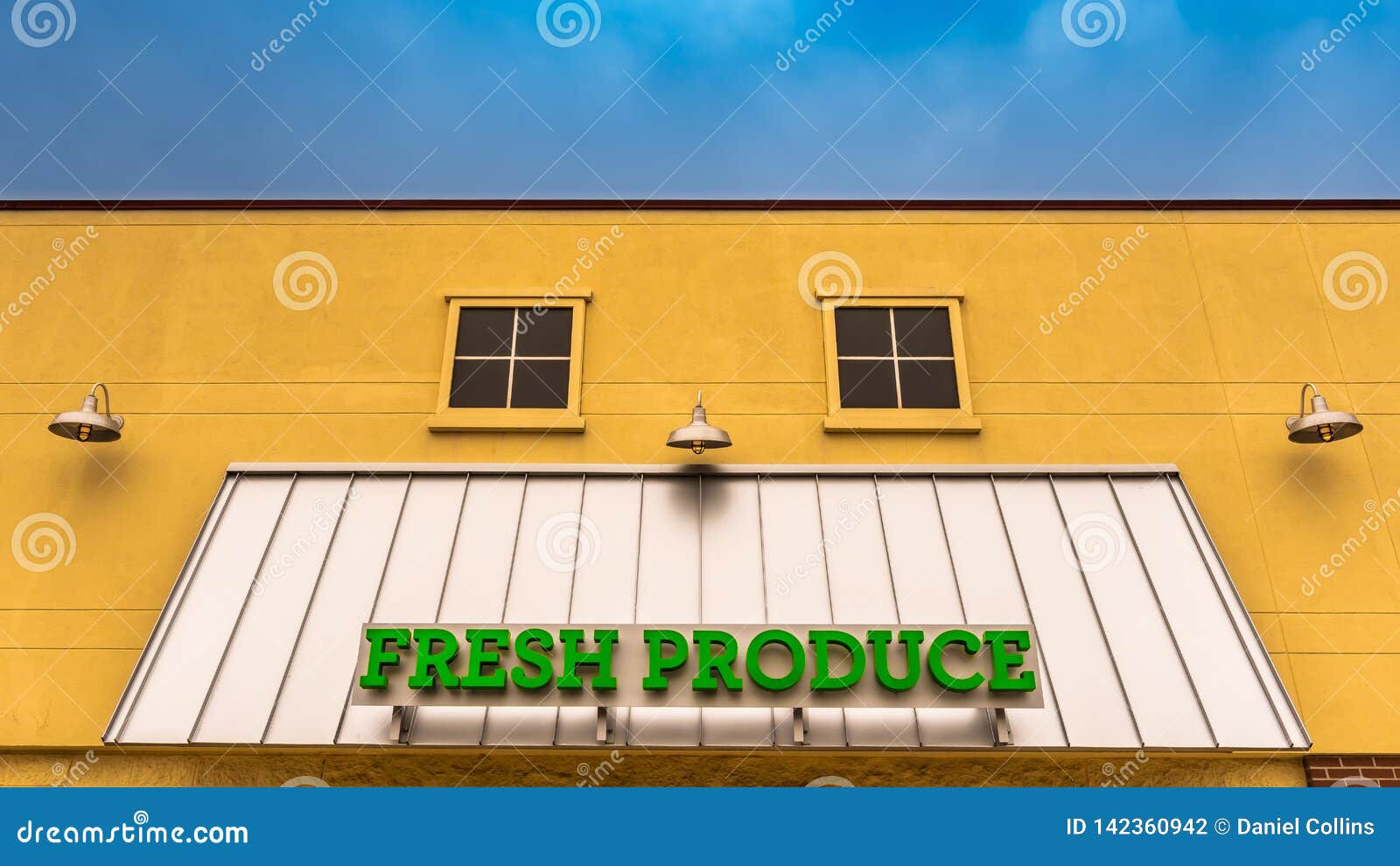 Bright Green Fresh Produce Sign on a Yellow Store Front Stock Photo ...