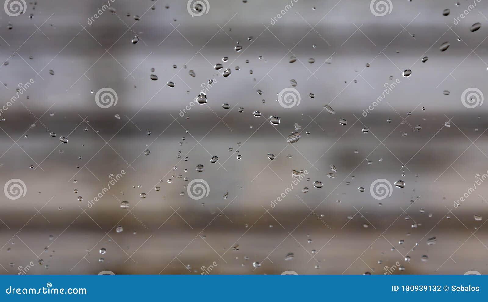 Rain drops on window glass stock photo. Image of moisture - 180939132