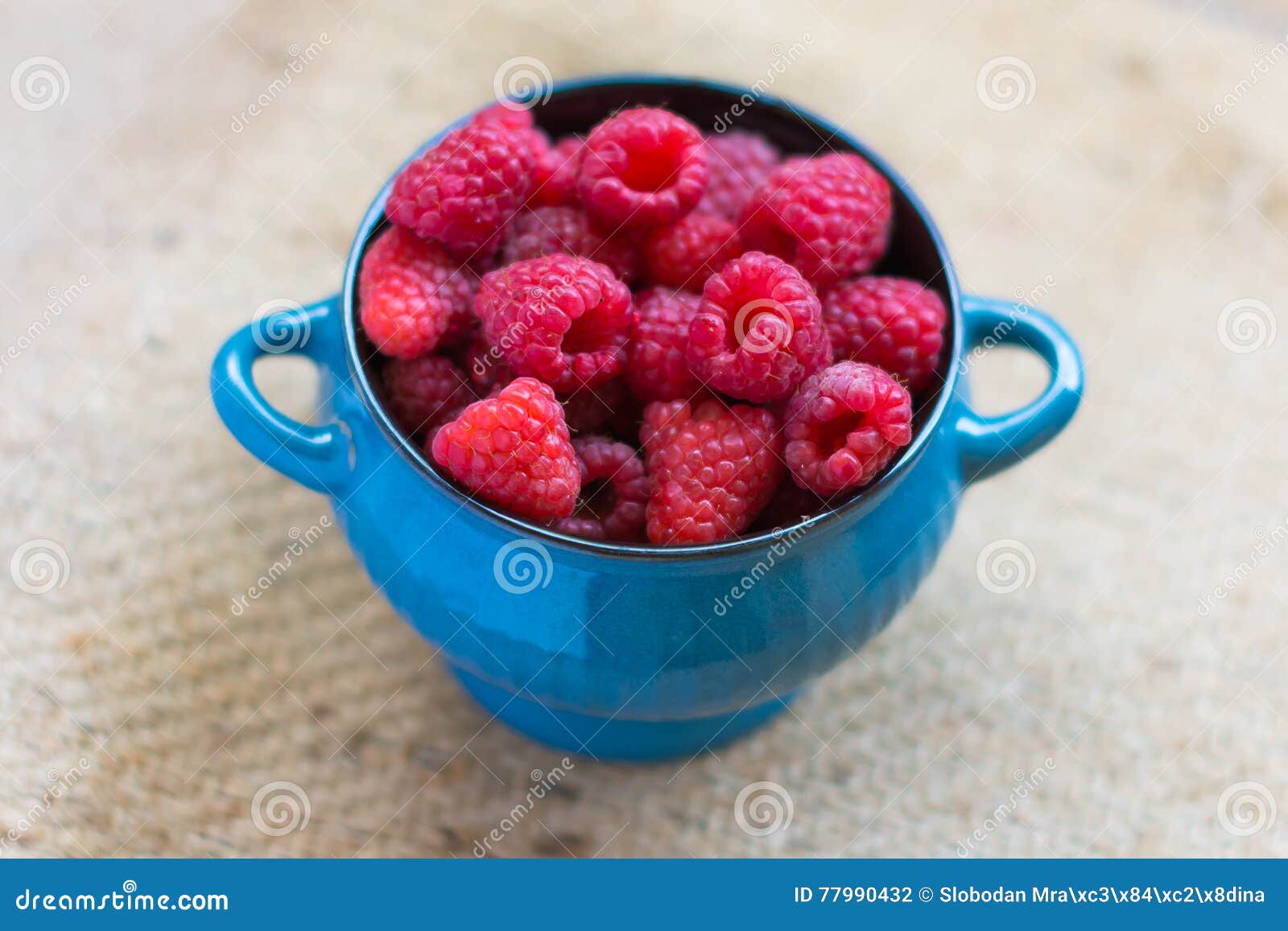Fresh Raspberries in a Blue Bowl Stock Photo - Image of berry ...