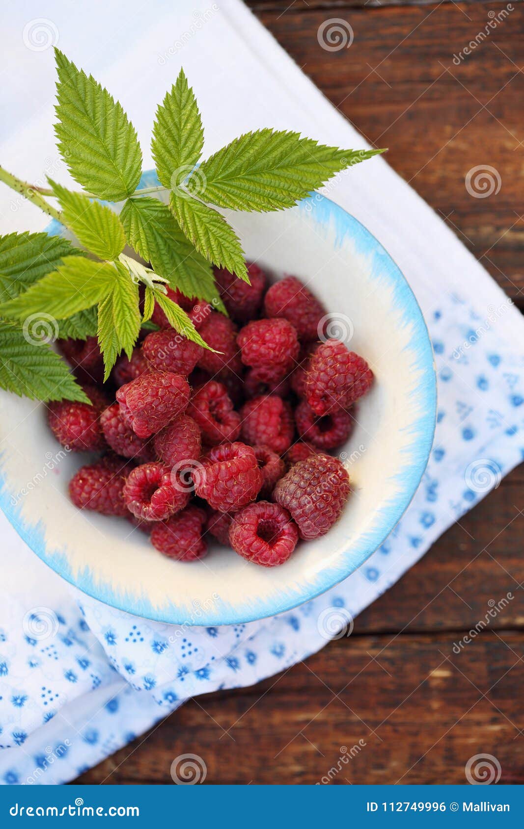 Raspberries in a Bowl in a Rustic Style Stock Photo - Image of ...