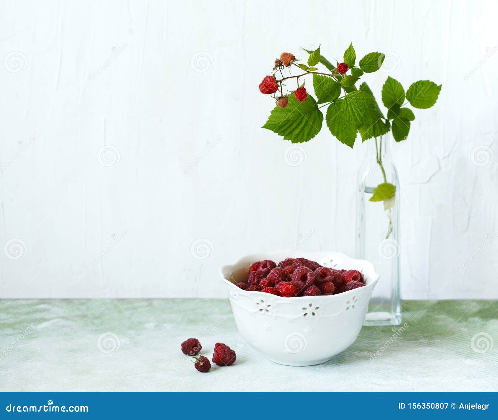 Fresh raspberries in bowl stock image. Image of food - 156350807
