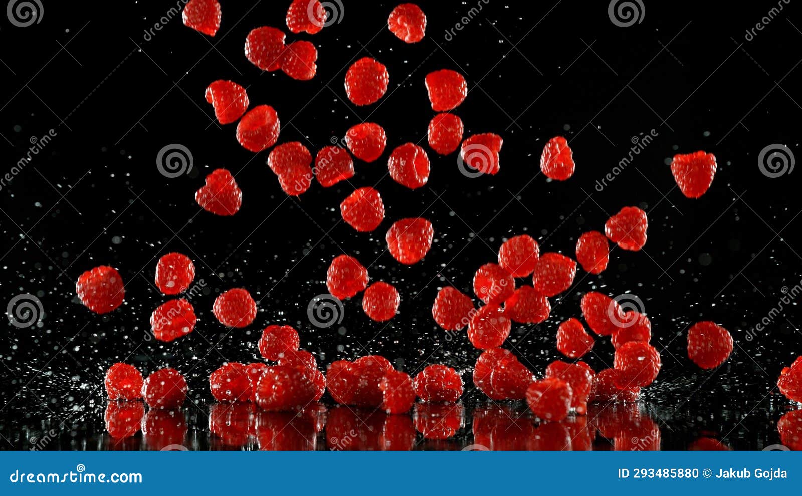 Fresh Raspberries Falling Down on Black Background Stock Photo - Image ...