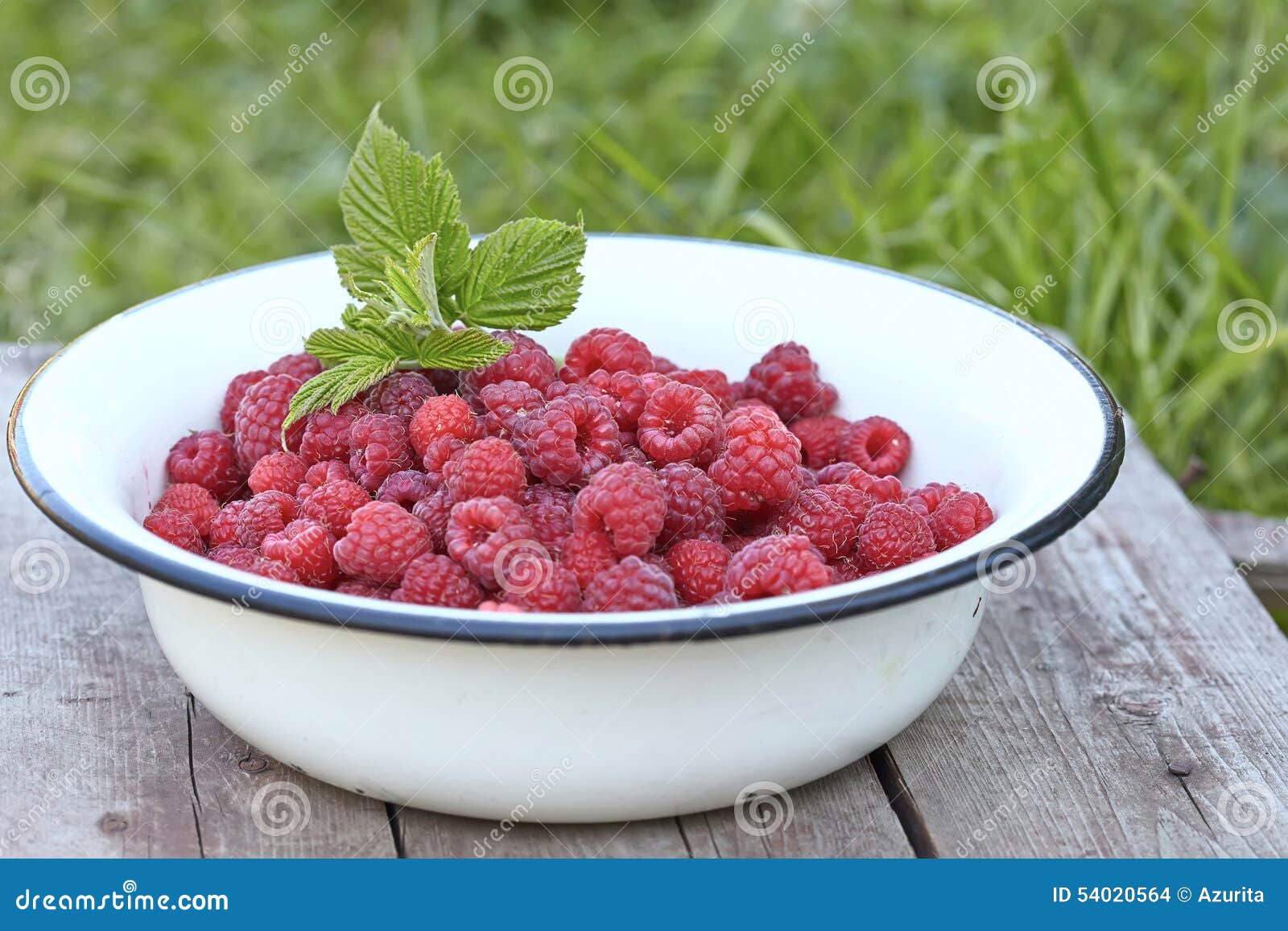 Fresh raspberry in a bowl stock photo. Image of closeup - 54020564